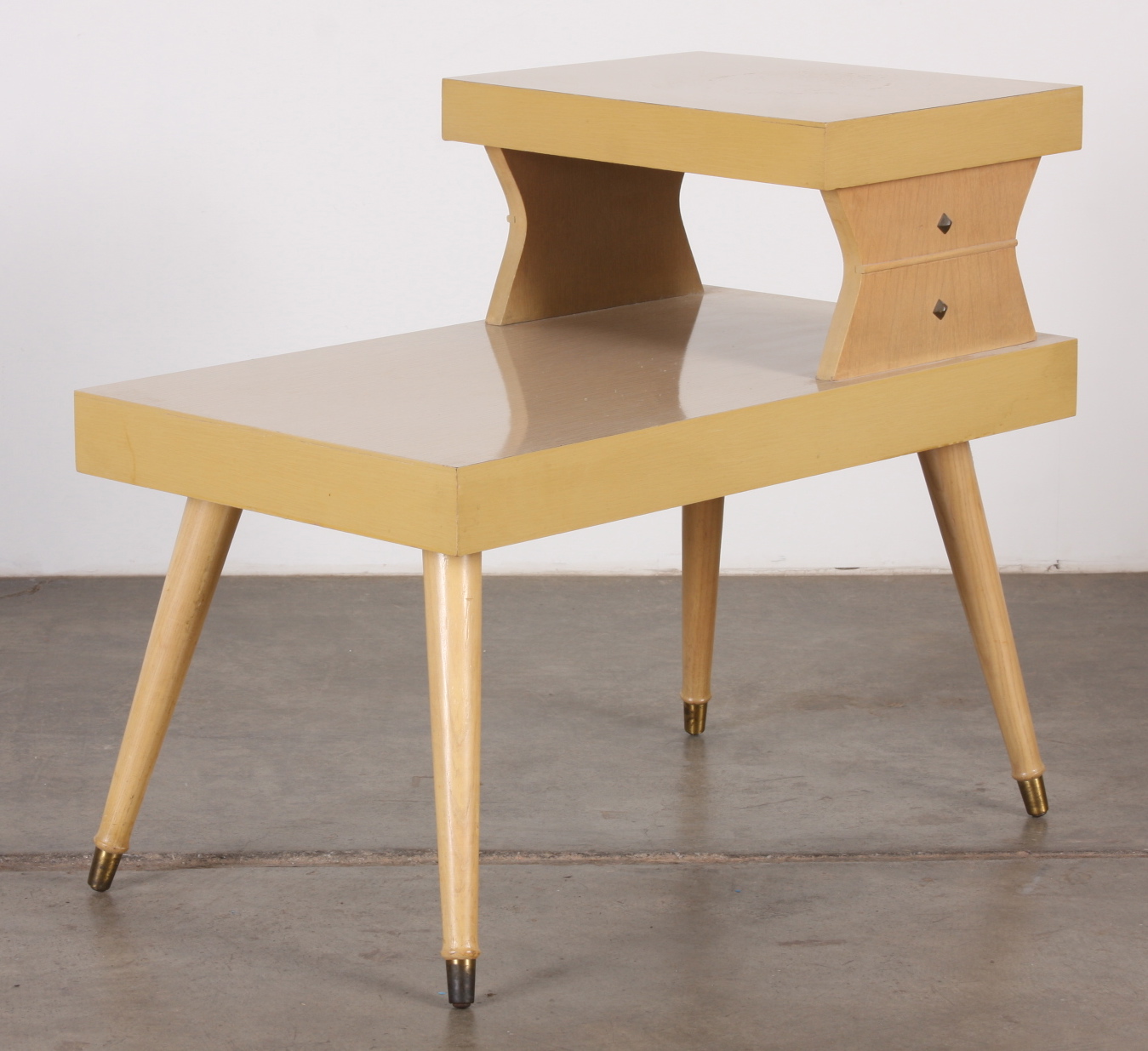 Pair of 1950's Mid Century Modern two tiered end tables | EBTH