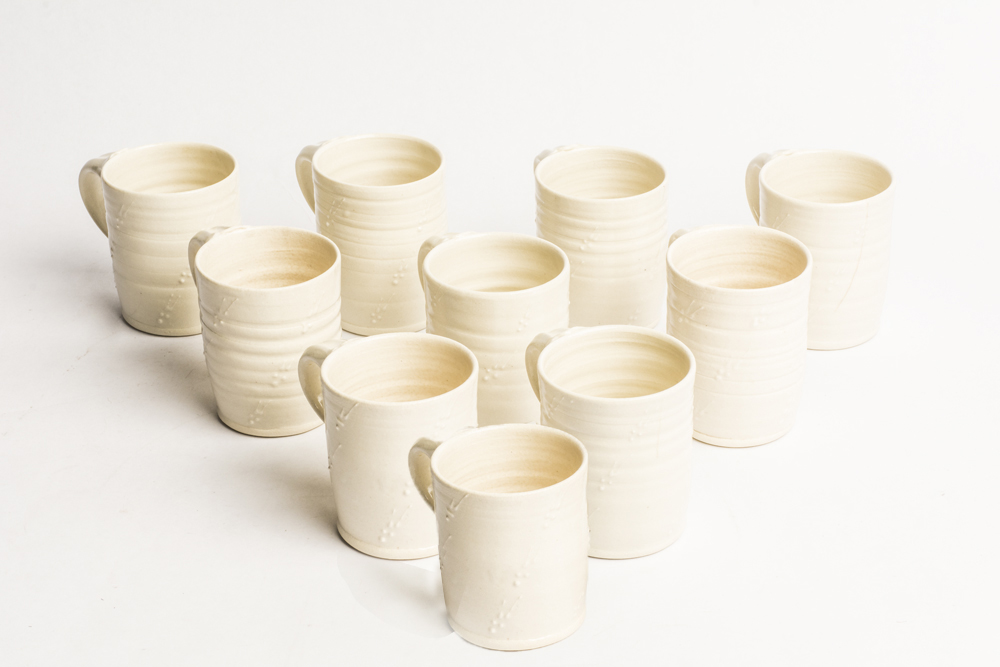 Set of Ten White Ceramic Mugs | EBTH