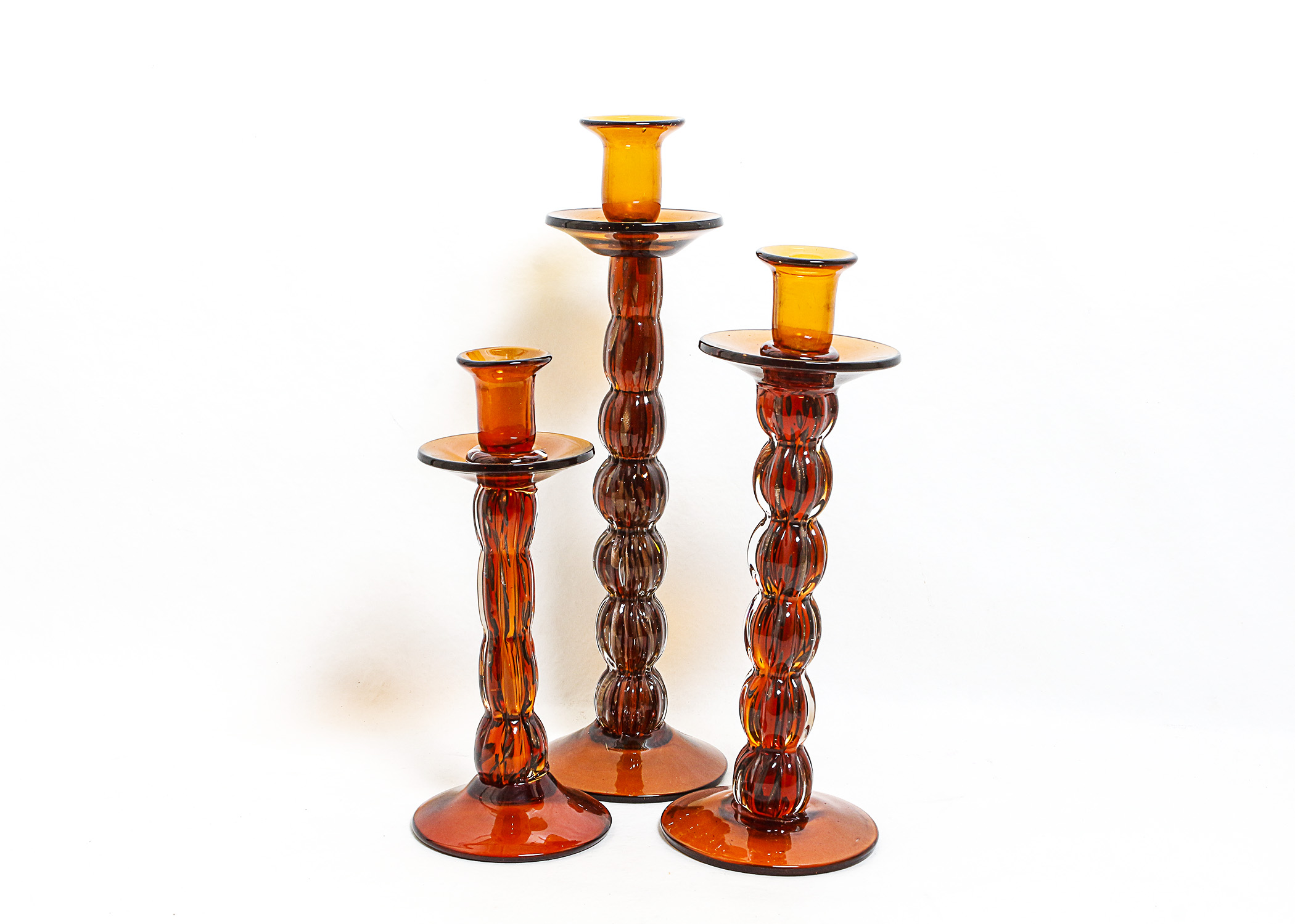 Trio of Amber Glass Candlesticks | EBTH