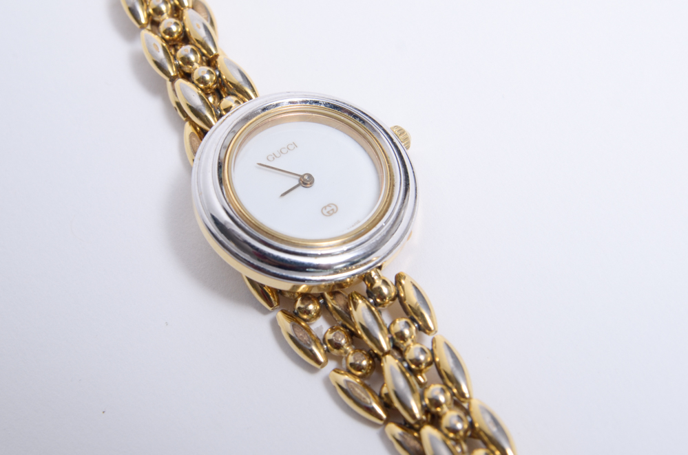 Gold Tone Gucci Interchangeable Watch with Assorted Bezel Rings | EBTH