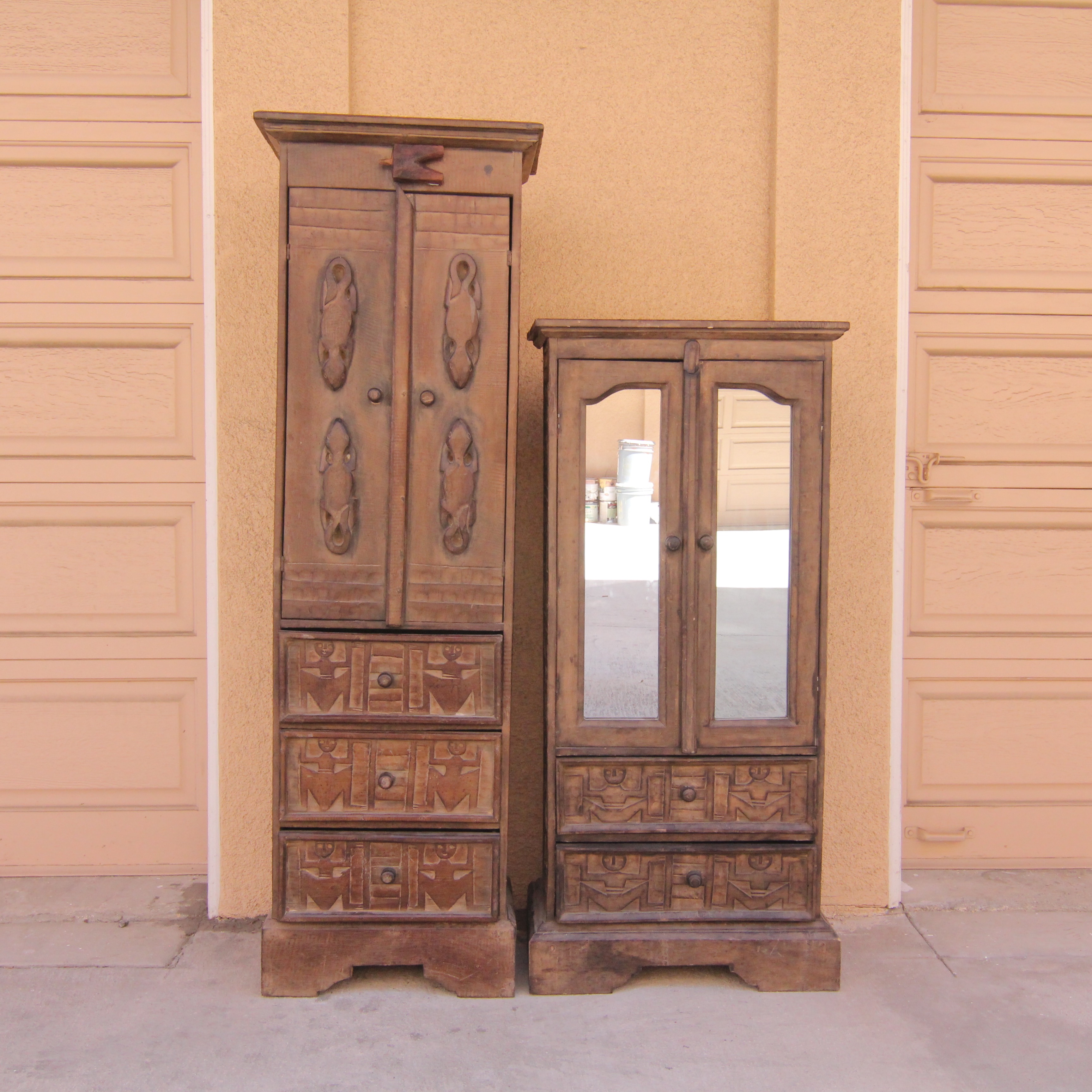 Pair of Handrafted Aztec Inspired Carved Wooden Cabinets | EBTH