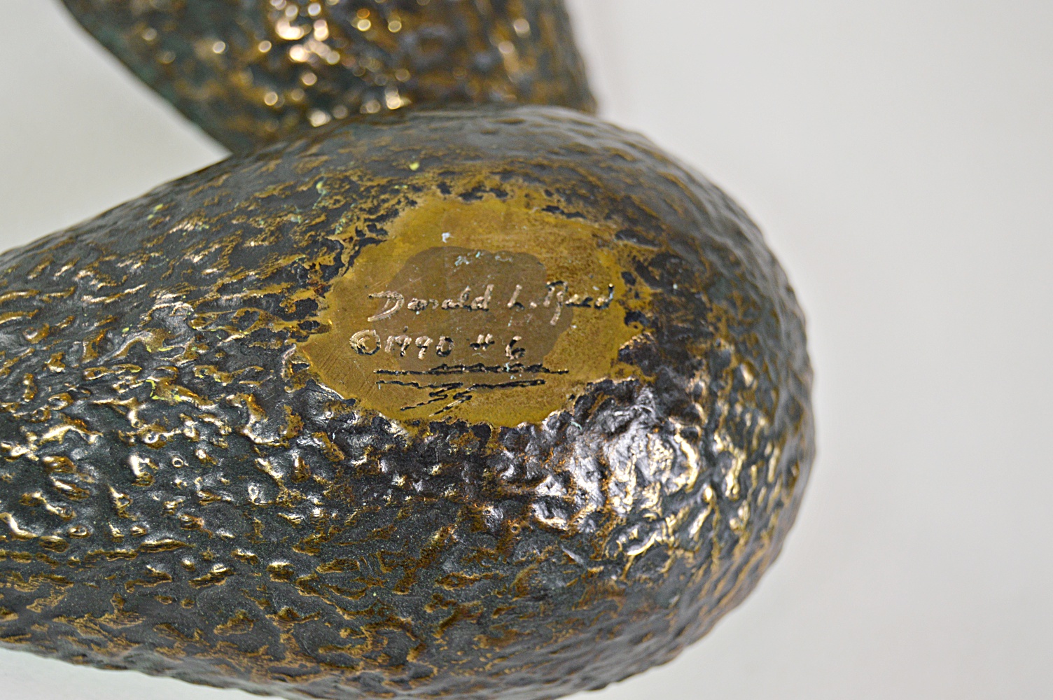 Donald Reed Bronze Sculpture of a Cut Avocado | EBTH
