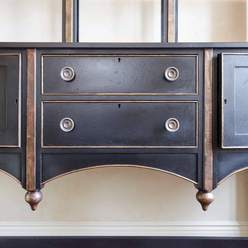 Architectonic Hollywood Regency Style Black and Gold Painted Hutch | EBTH