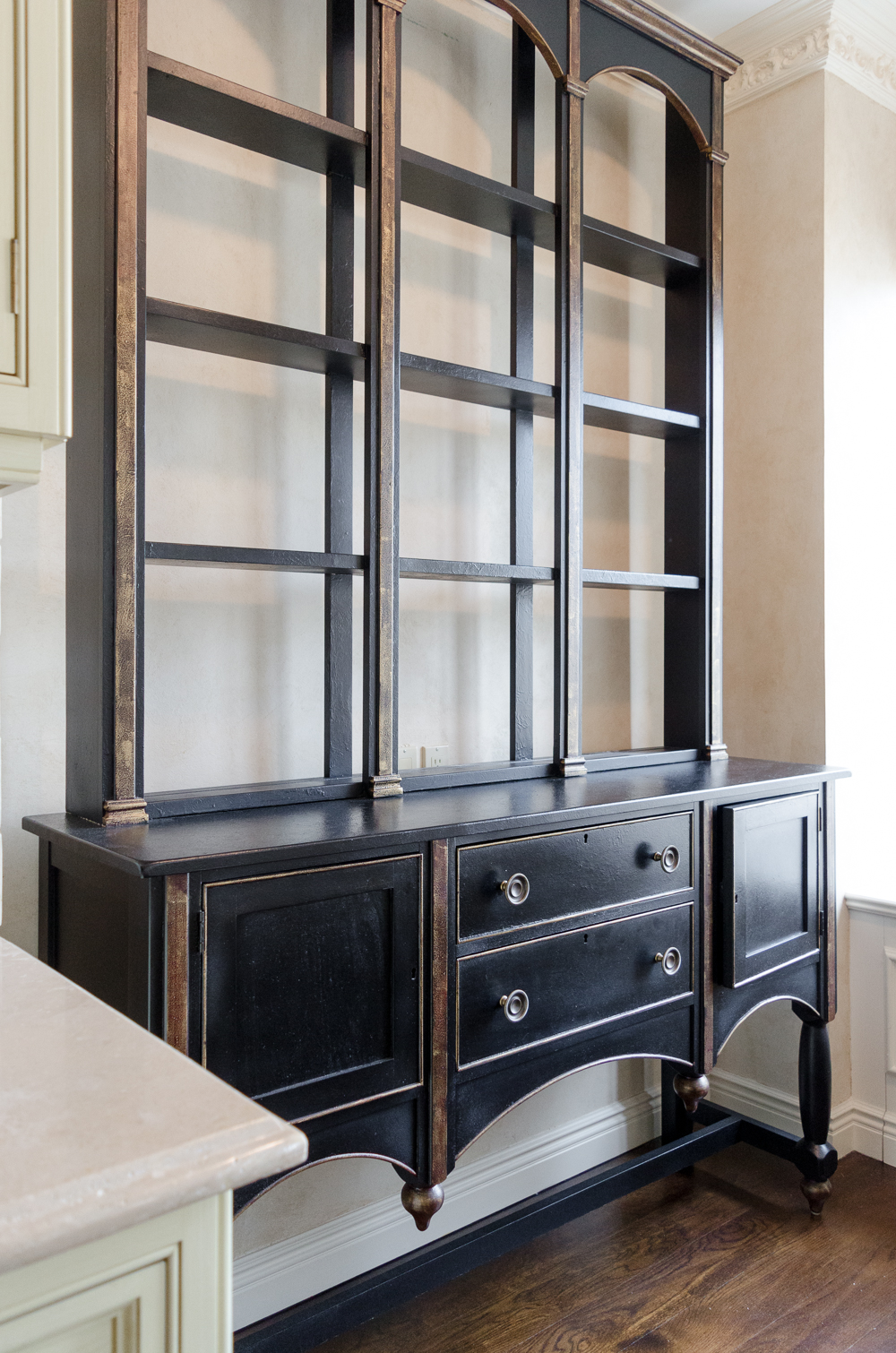 Architectonic Hollywood Regency Style Black and Gold Painted Hutch | EBTH