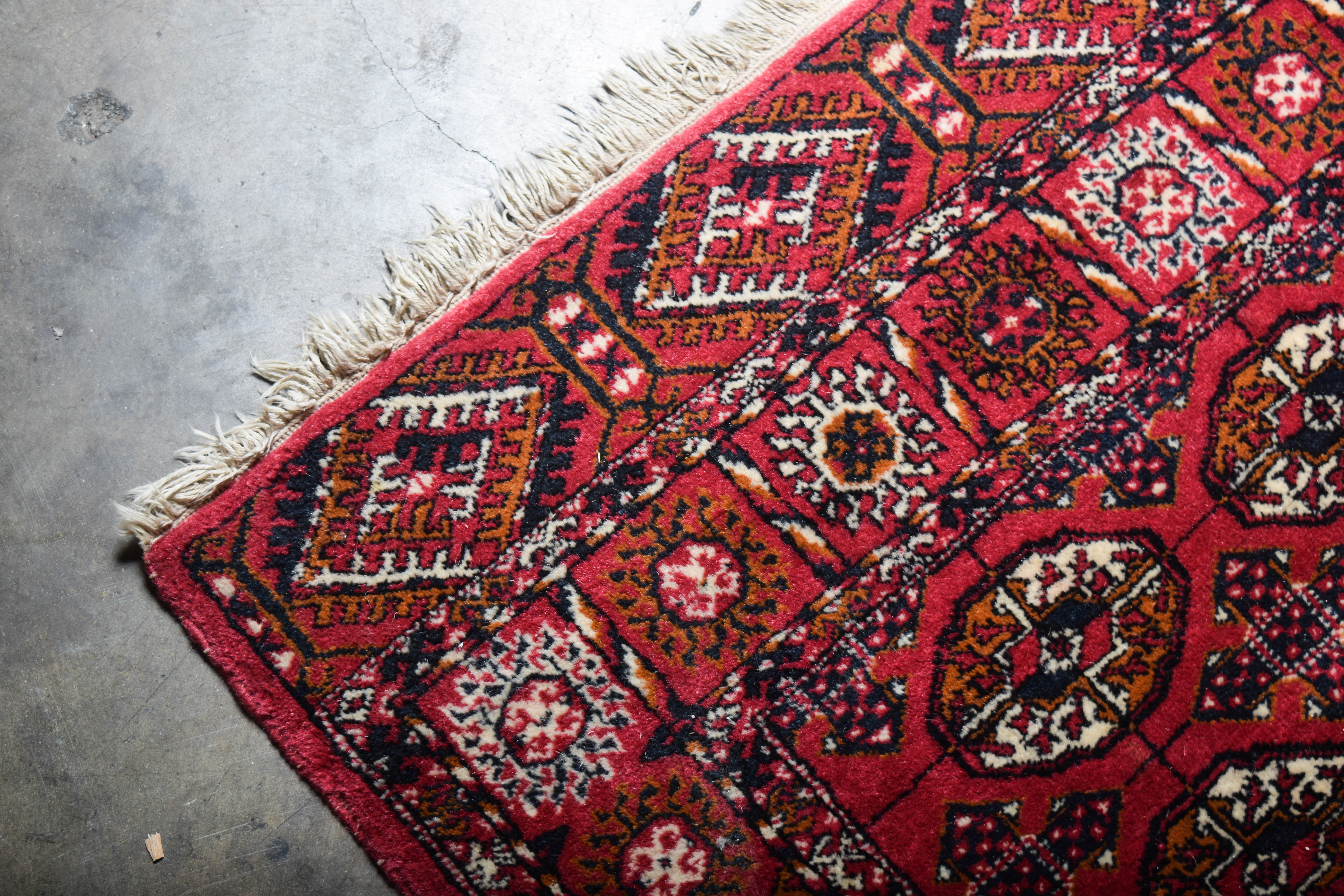 Hand-Knotted Pakistani Bokhara Area Rug | EBTH