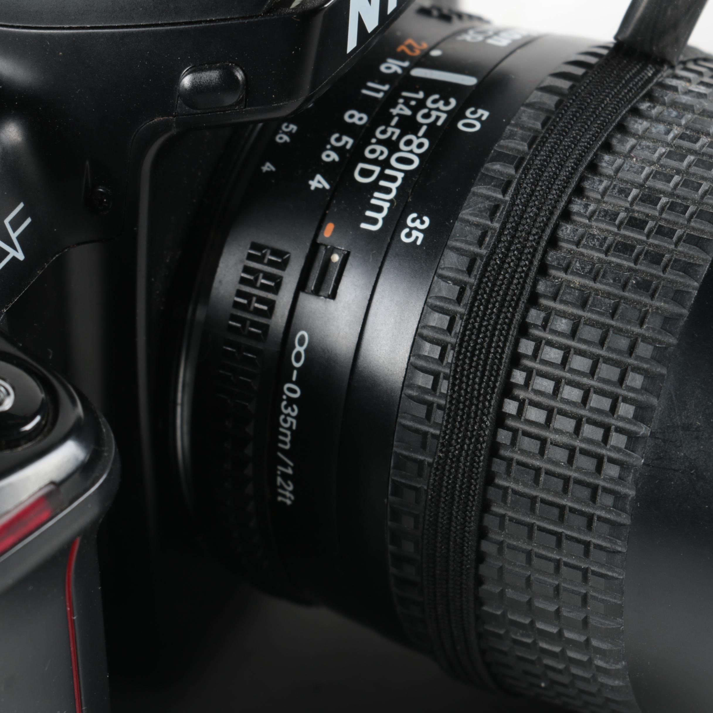 Nikon N6006 SLR Camera with Tripod, Bag, and Accessories | EBTH