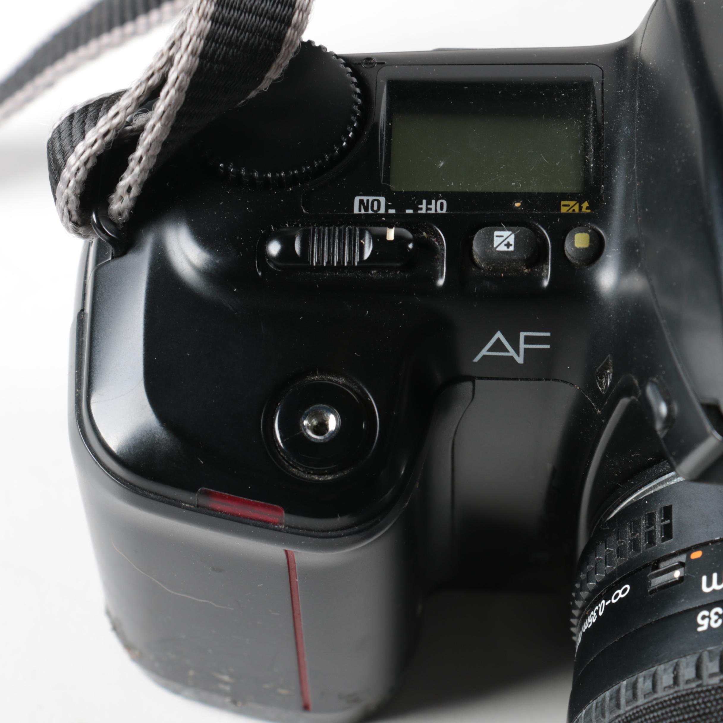 Nikon N6006 SLR Camera with Tripod, Bag, and Accessories | EBTH