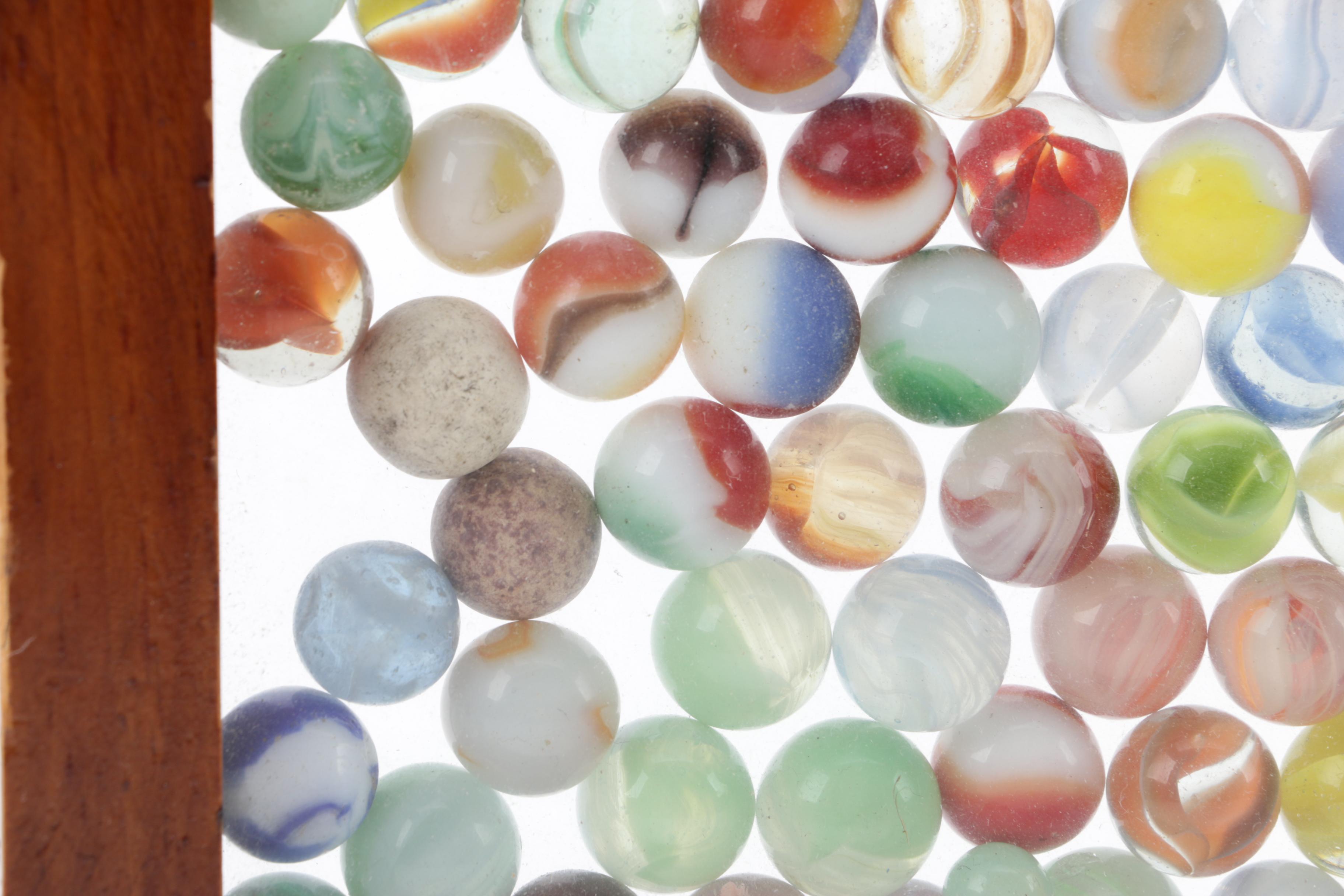 Display Case with Glass Marbles | EBTH