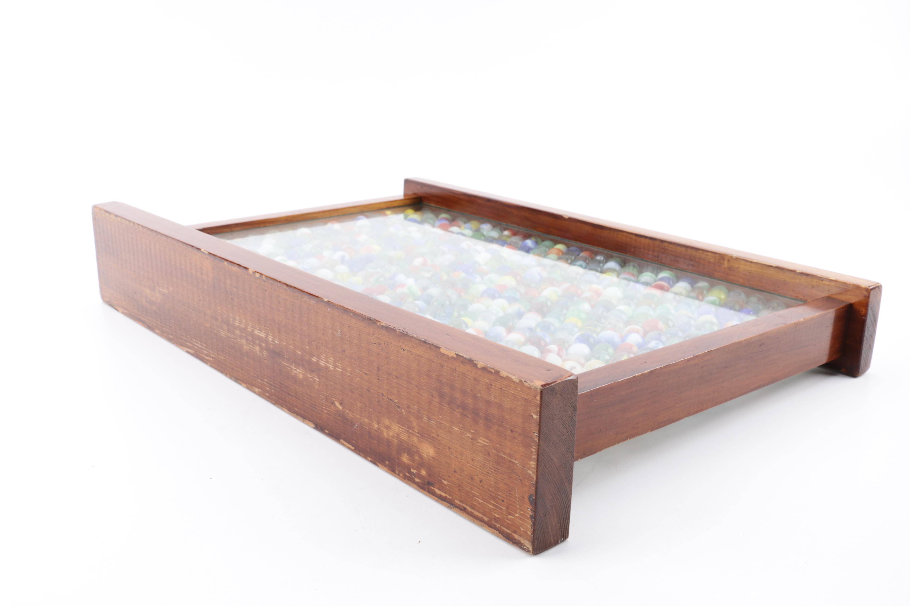 Display Case with Glass Marbles | EBTH