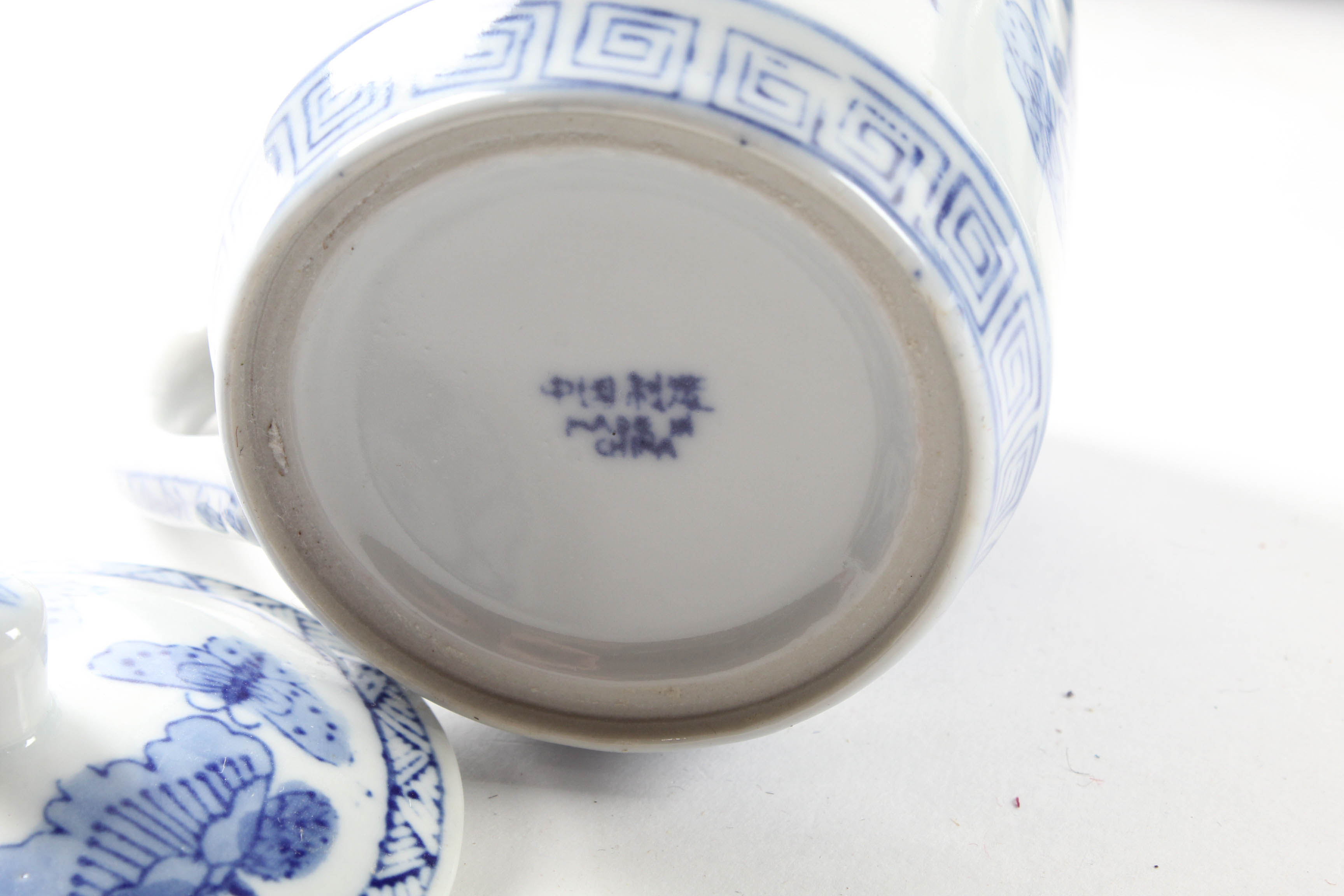 Asian Tableware With Chinese Blue and White Lidded Tea Cups and Sauce ...