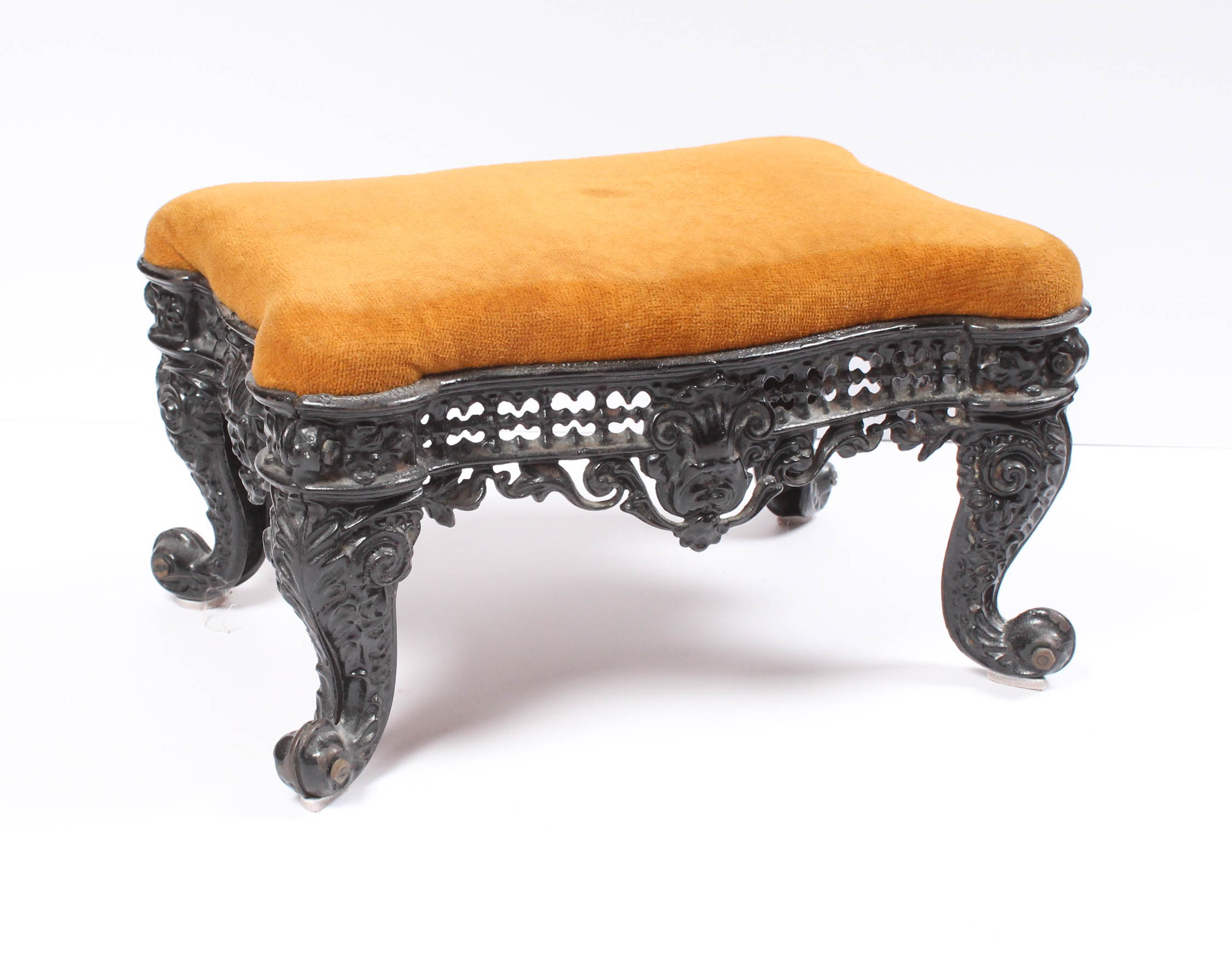 Cast Metal Upholstered Footstool | EBTH
