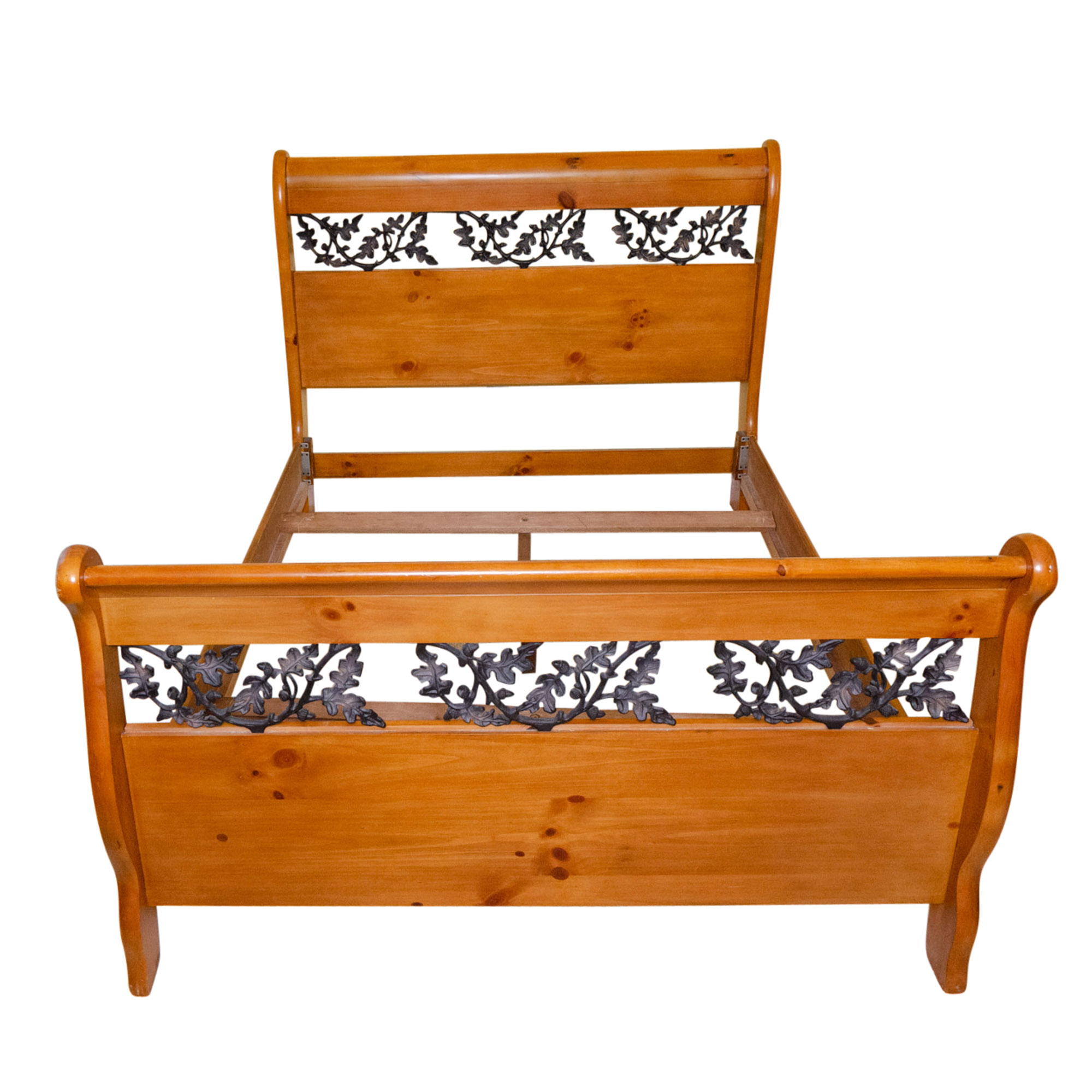 Wood sleigh bed with wrought iron store
