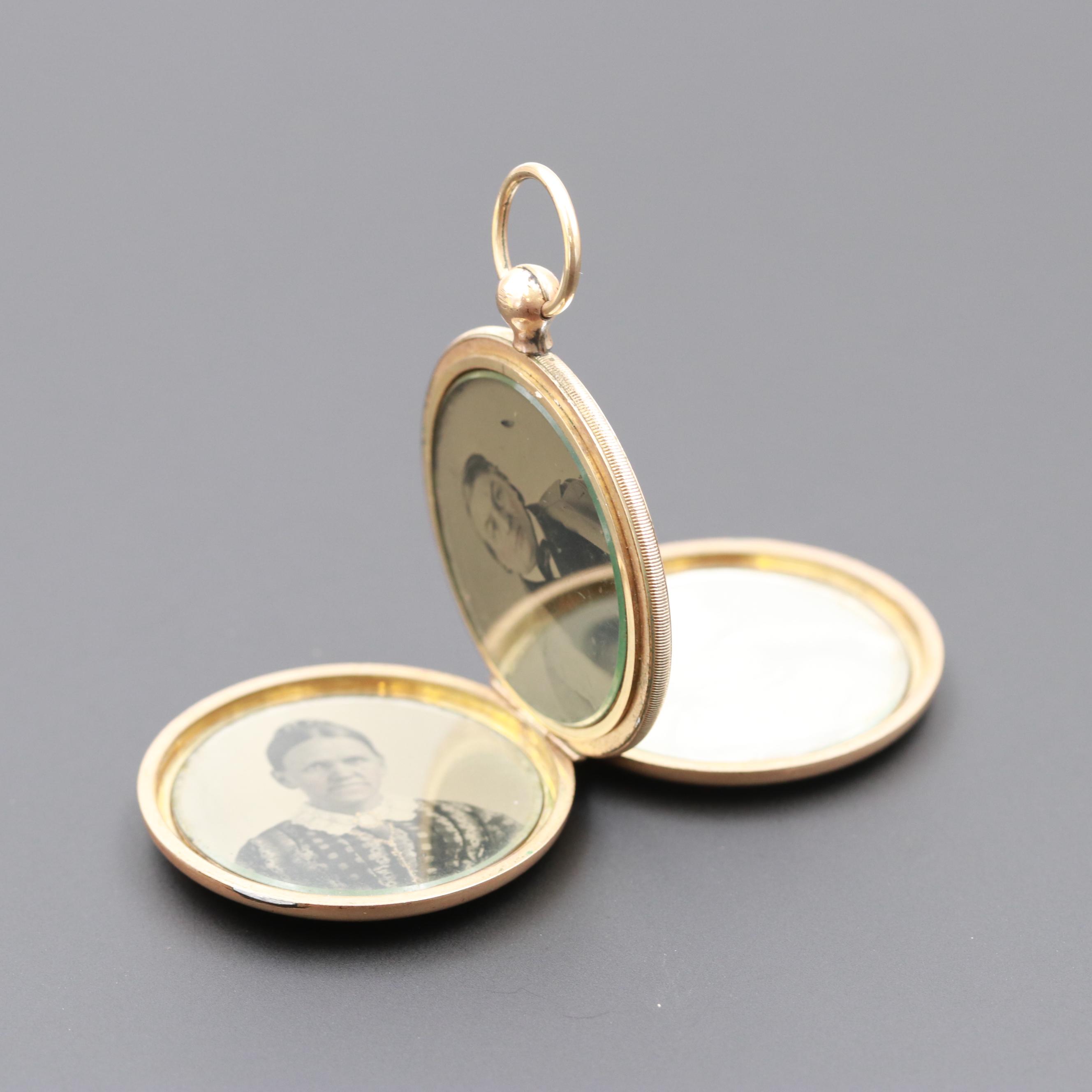 Pocket Watch Style Locket with Four Vintage Photographs | EBTH
