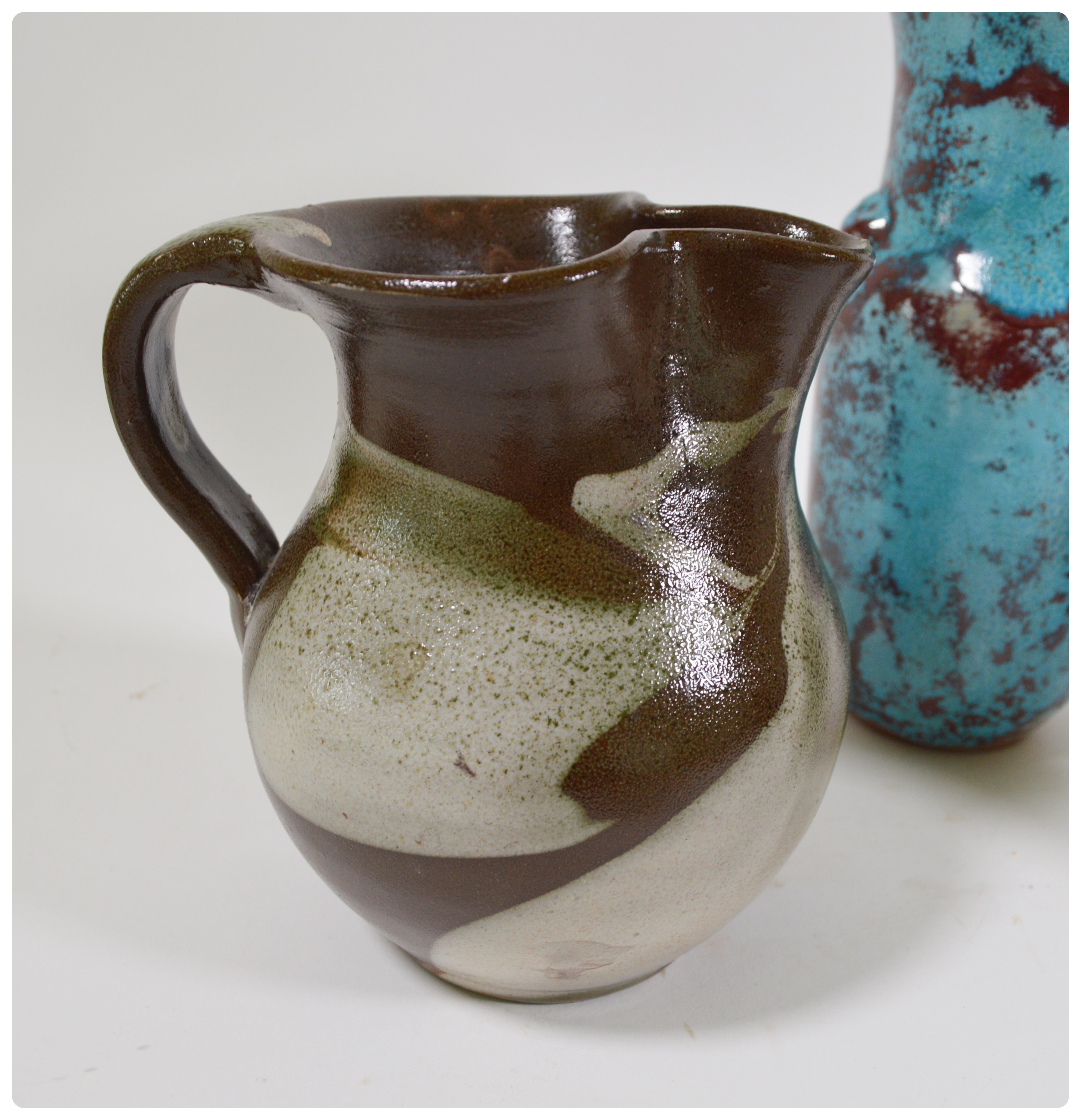 Jugtown Ware Pottery Vase with Wick-Werke and Other Pottery Pitchers | EBTH