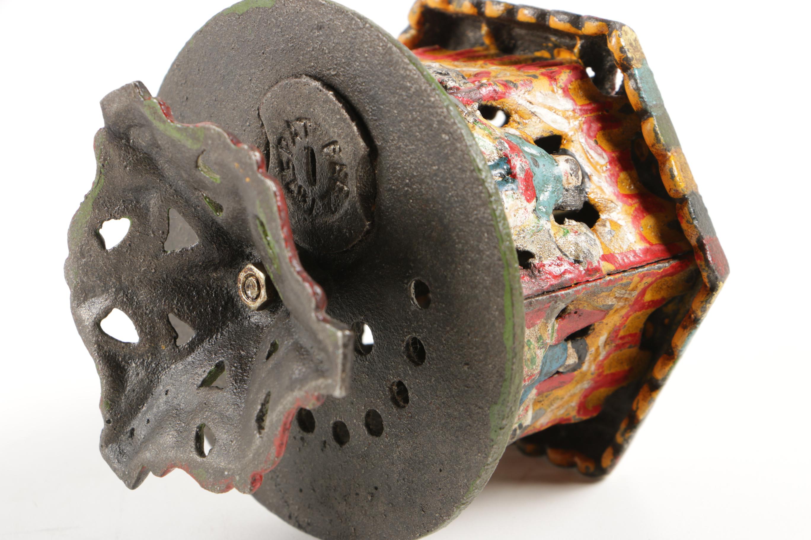 Rotating Painted Cast Iron Carousel Coin Bank, Antique | EBTH