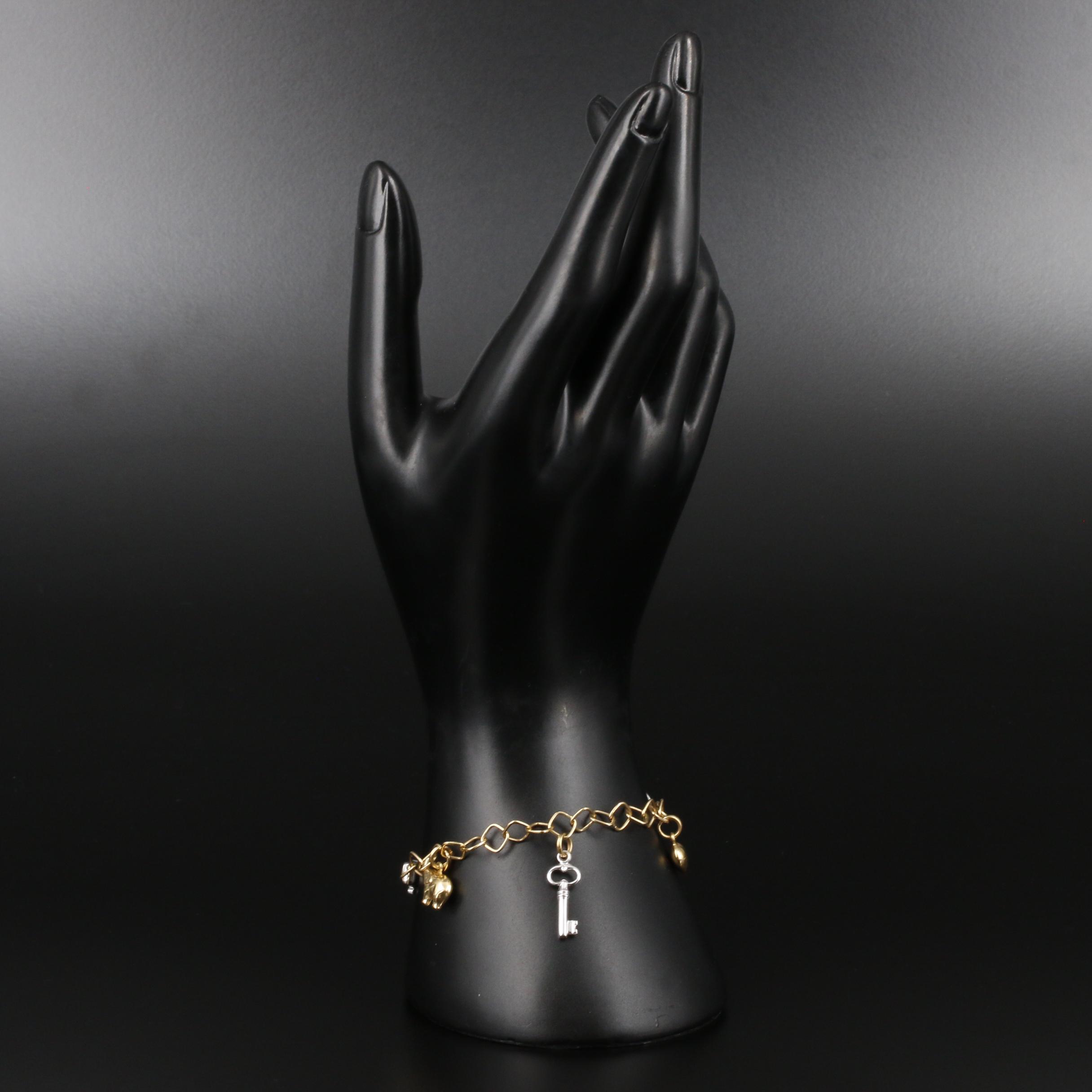 Chimento 18K Gold Diamond Charm Bracelet Featuring Elephant, Heart and ...