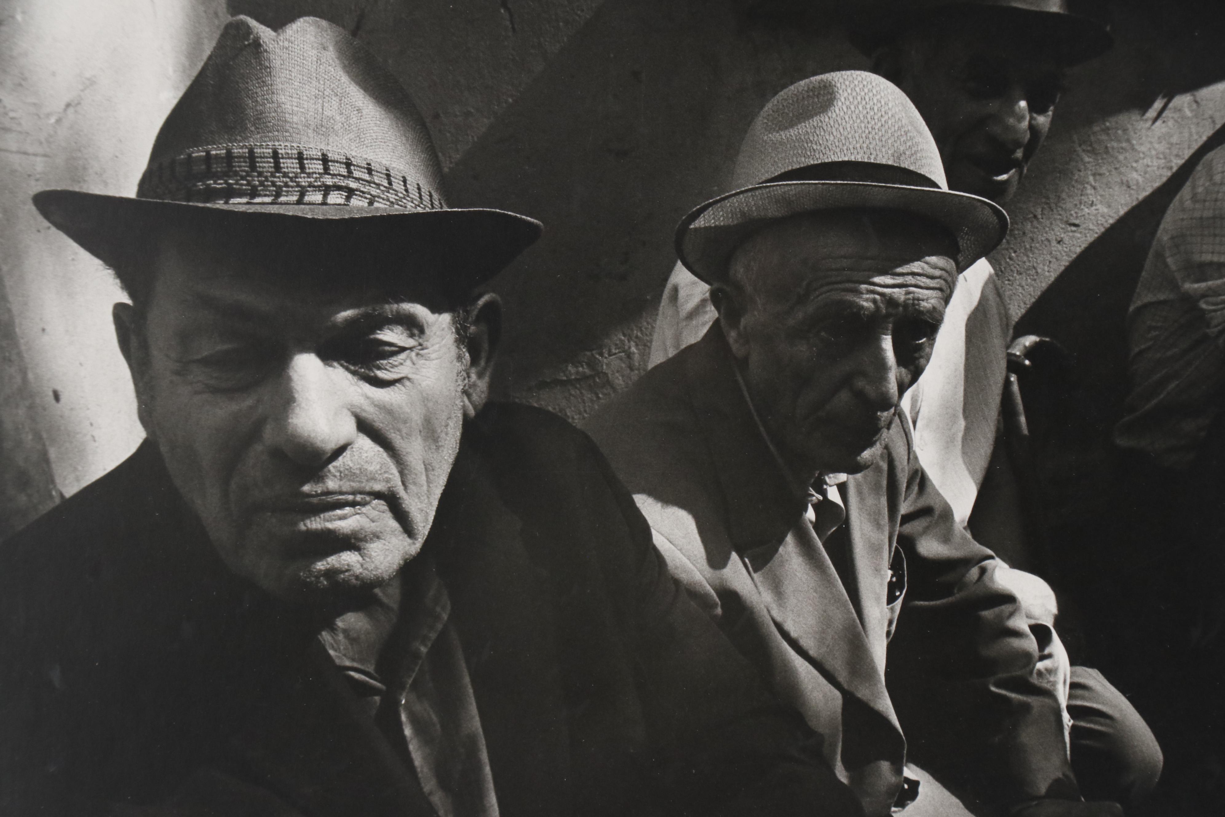 Mark Ritter Black and White Photograph of Seated Men with Hats | EBTH