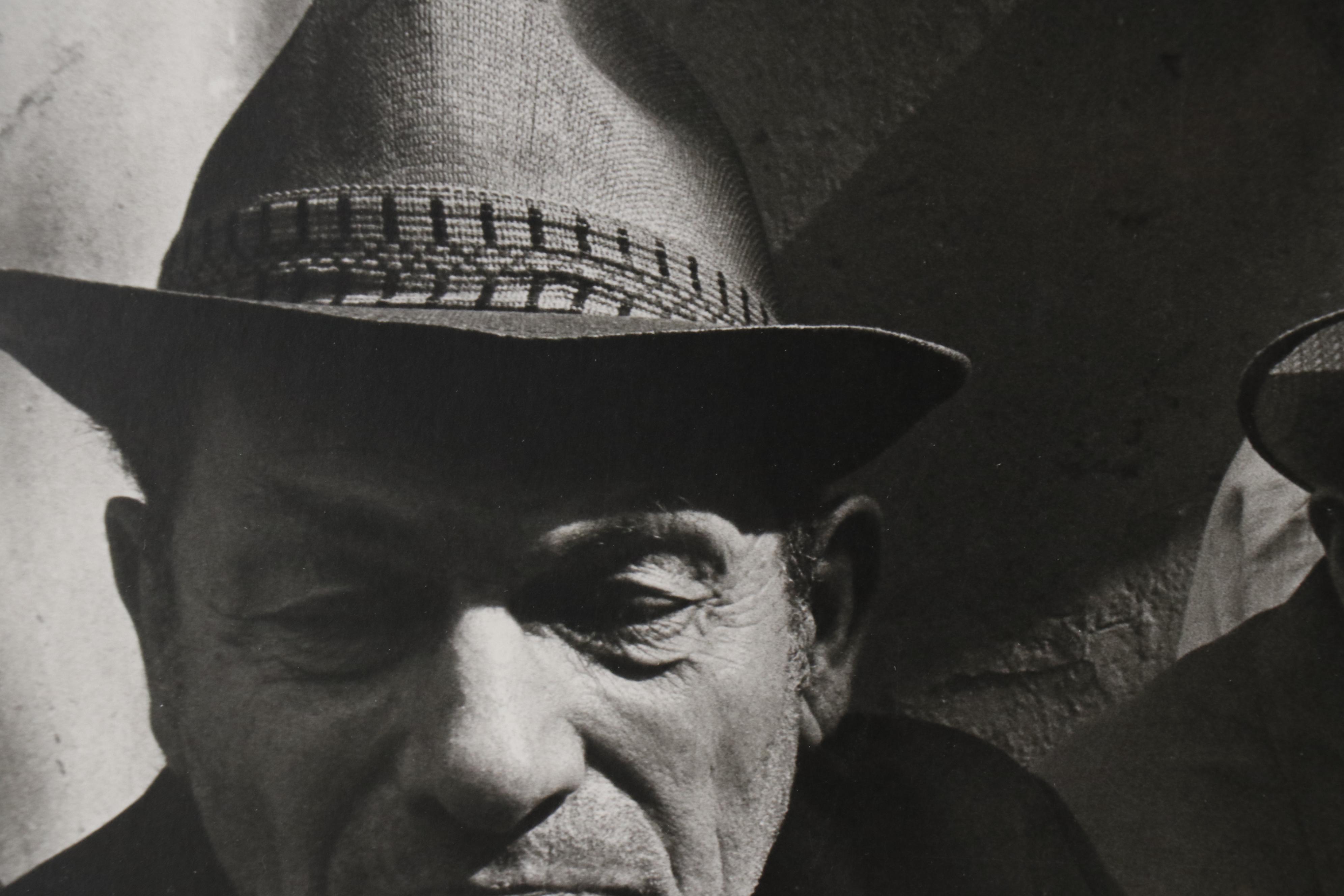 Mark Ritter Black and White Photograph of Seated Men with Hats | EBTH