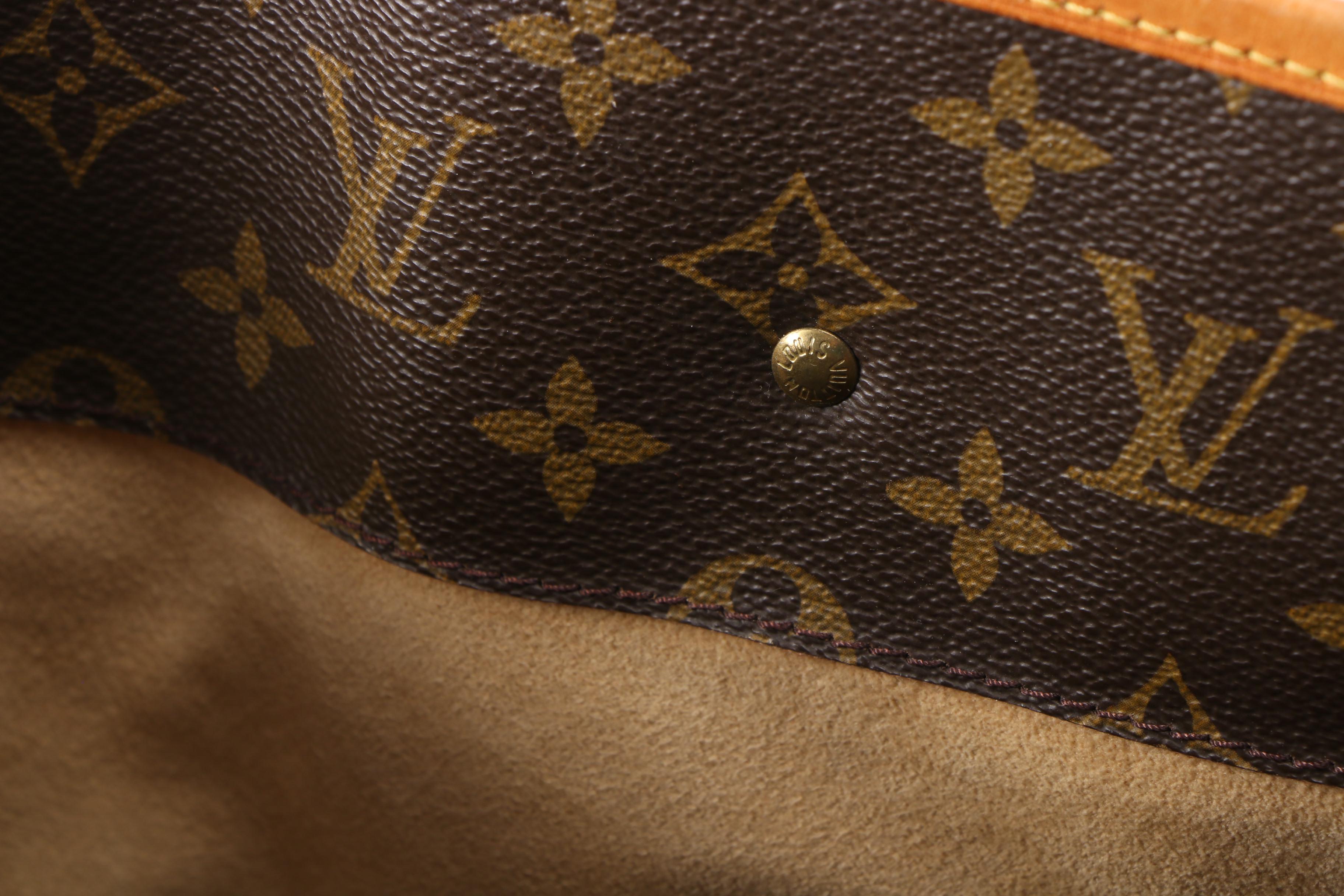 Louis Vuitton Rivoli Briefcase in Monogram Canvas and Vachetta Leather ...