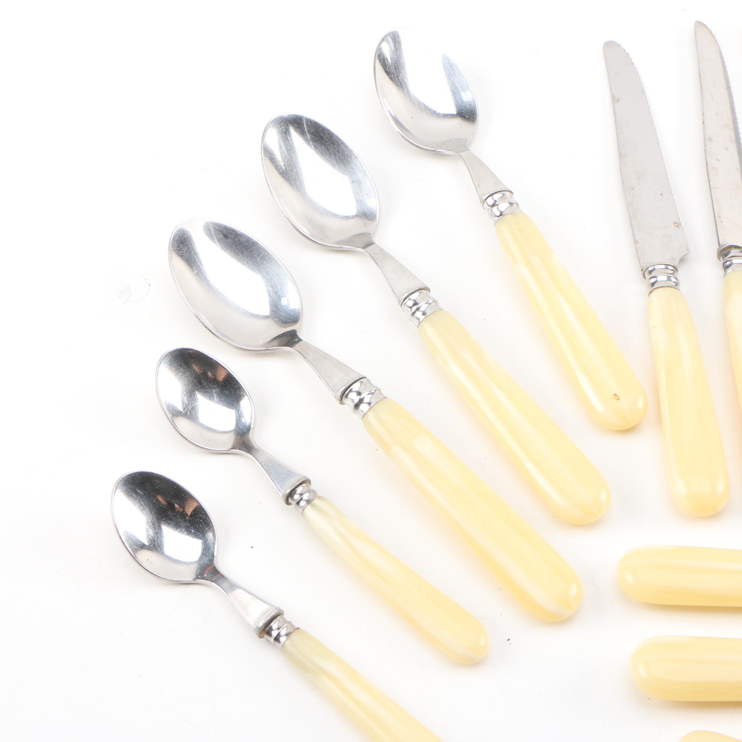 Jean Dubost "Marbled Ivory" Resin Handled Flatware | EBTH