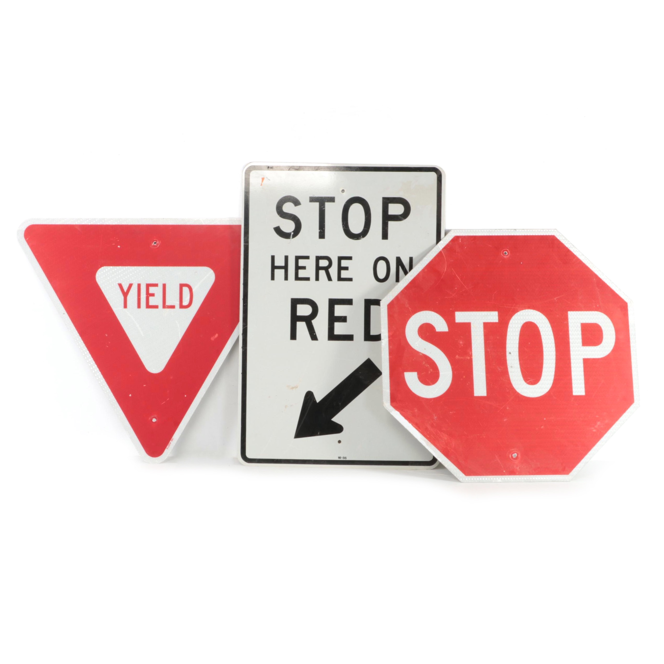 "STOP", "YIELD" and "STOP HERE ON RED" Metal Road Signs | EBTH