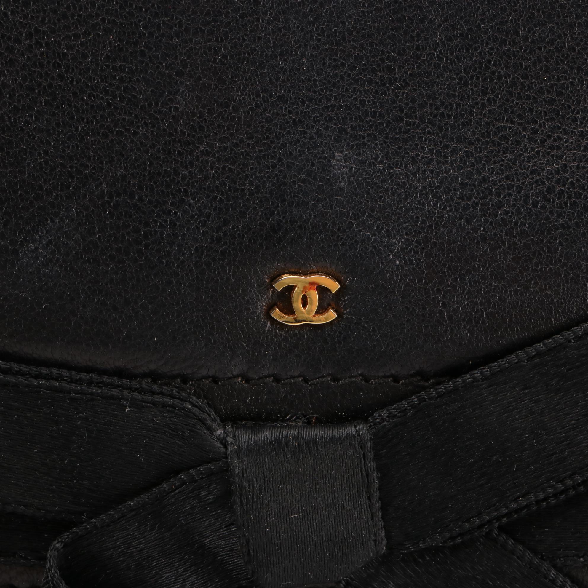 Chanel CC Ribbon and Leather Convertible Clutch with Bow | EBTH