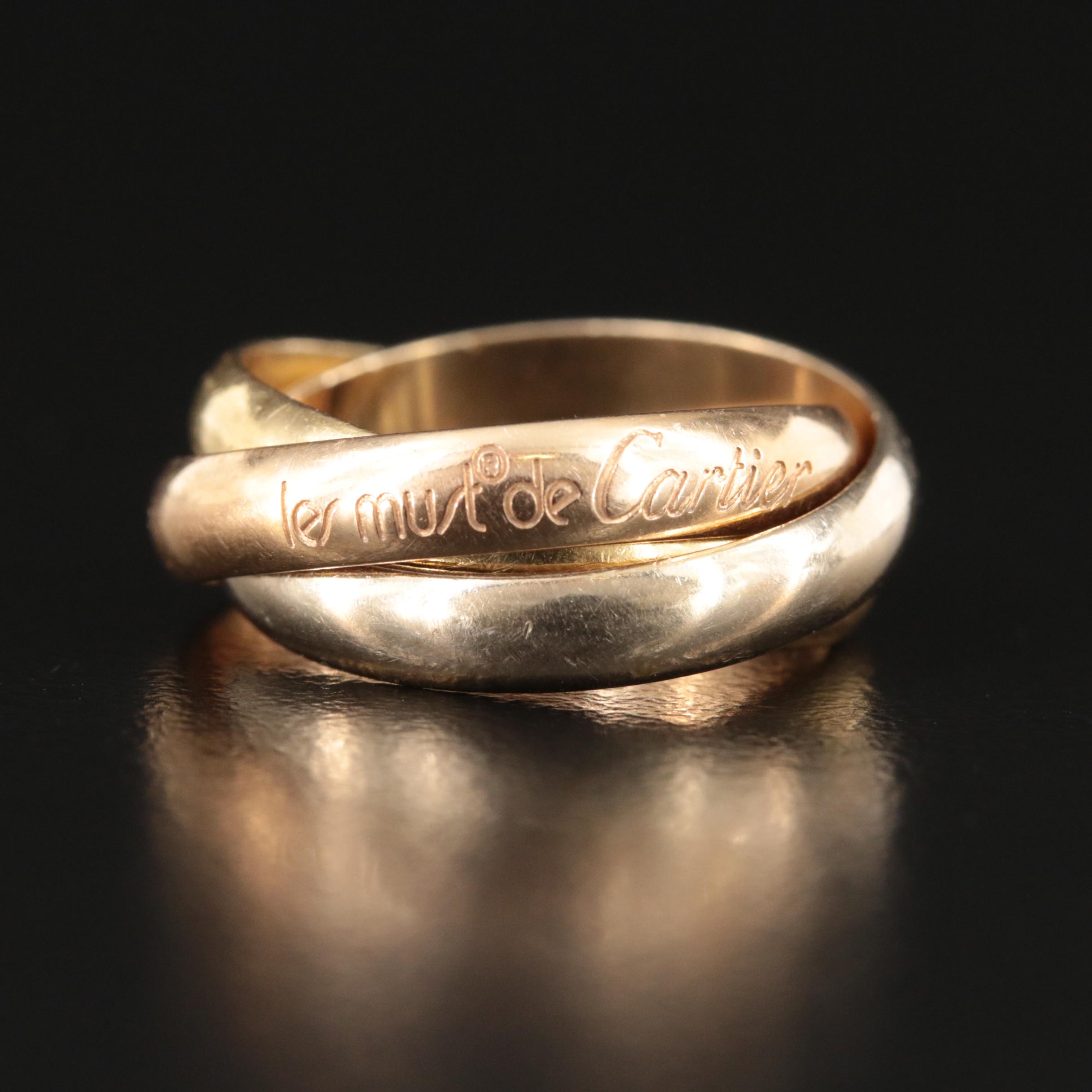 Les Must de Cartier 18K Tri-Color Trinity Rolling Ring | EBTH