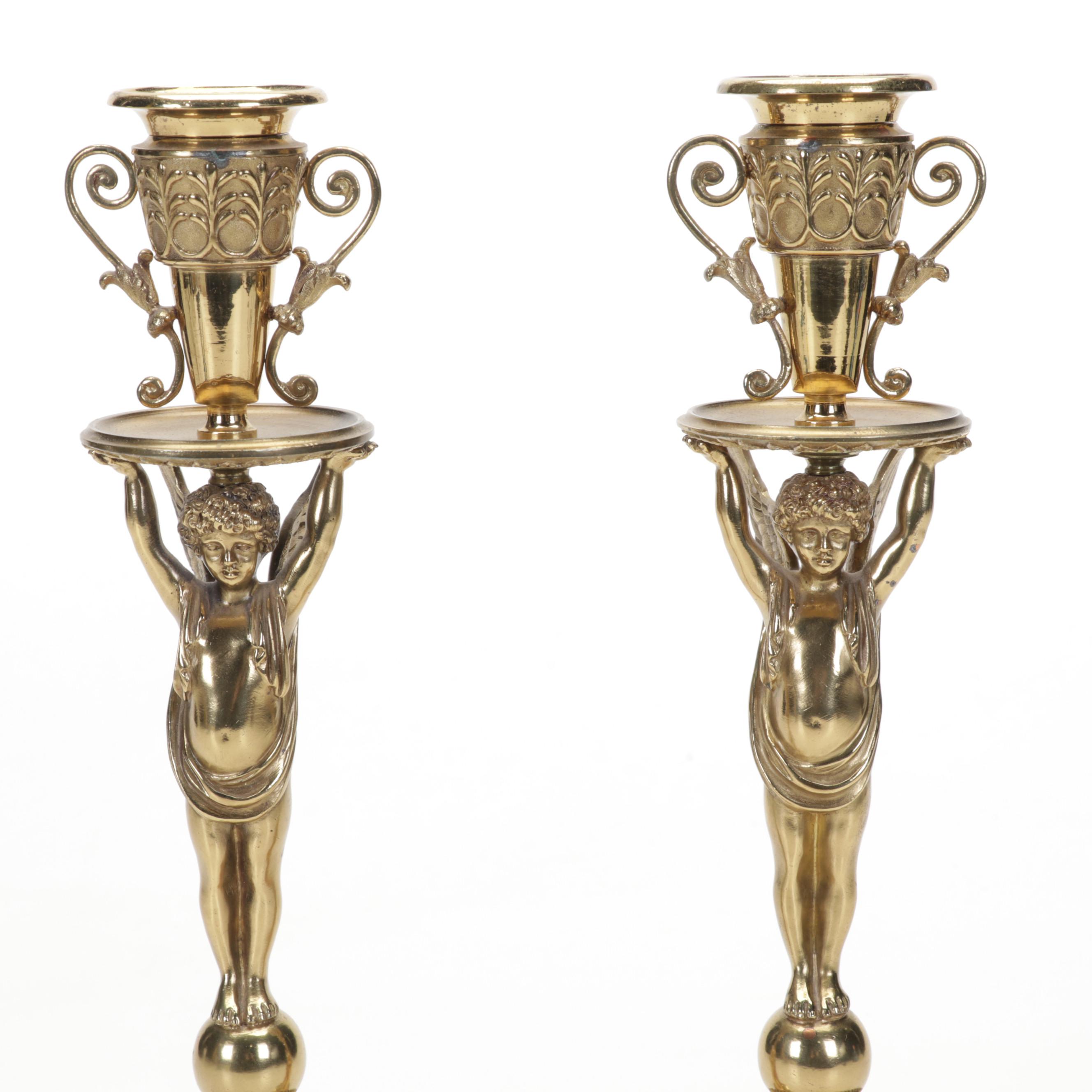 Pair of French Empire Gold Tone Angel and Cherub Candlesticks | EBTH
