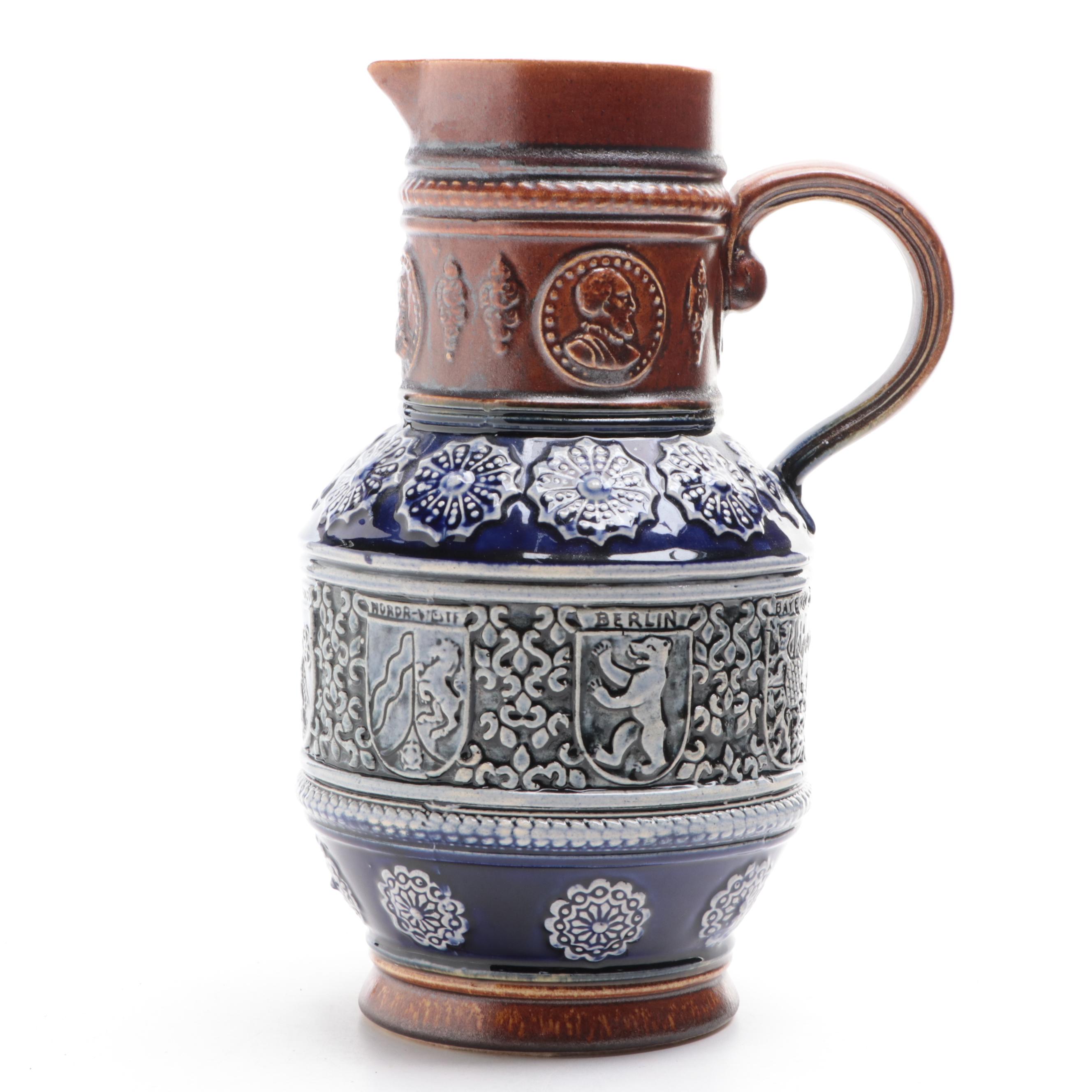 German Stoneware Jug with Molded Relief Decoration | EBTH