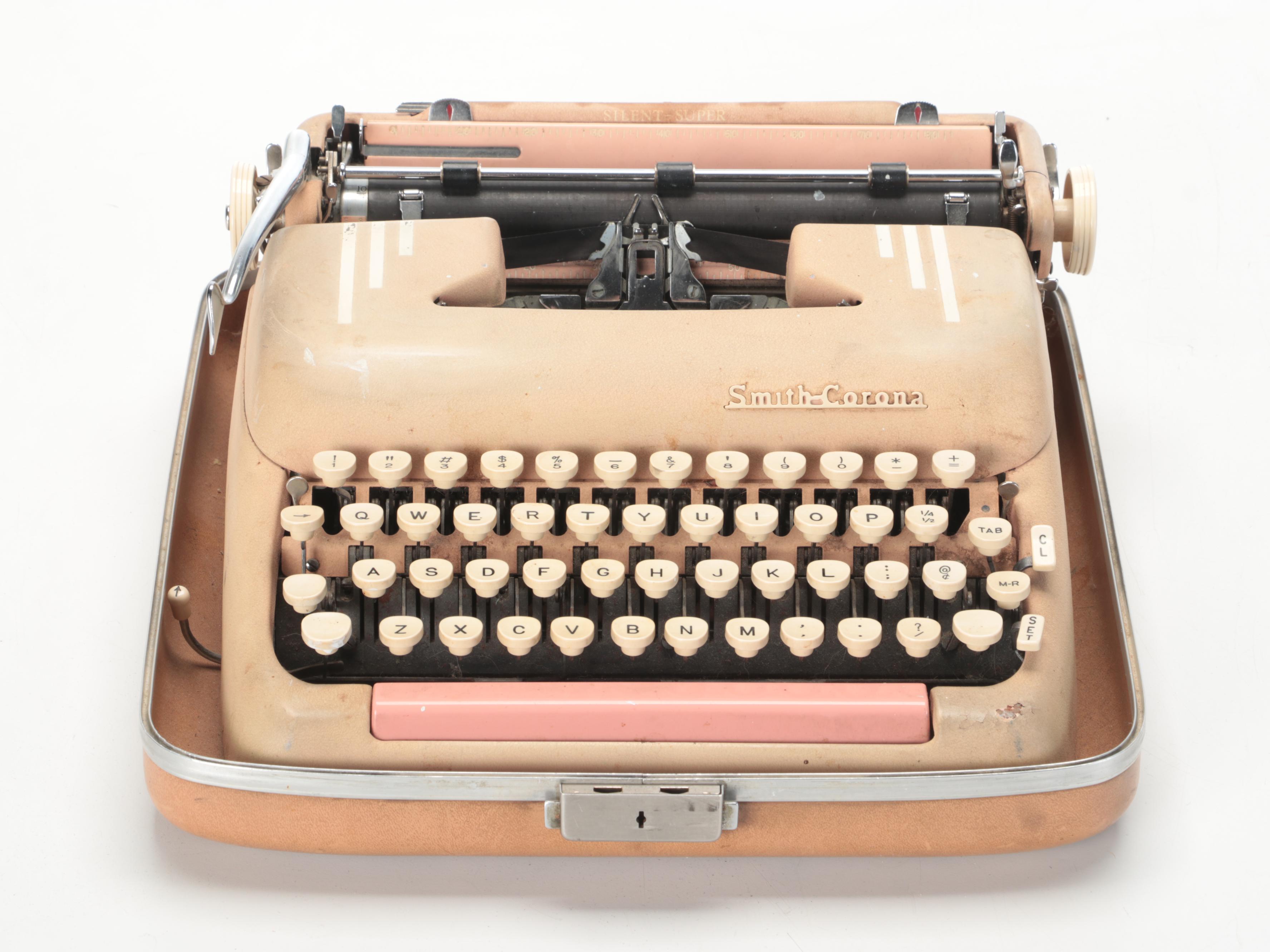 Smith-Corona Silent Super Portable Typewriter and Corded Telephone | EBTH