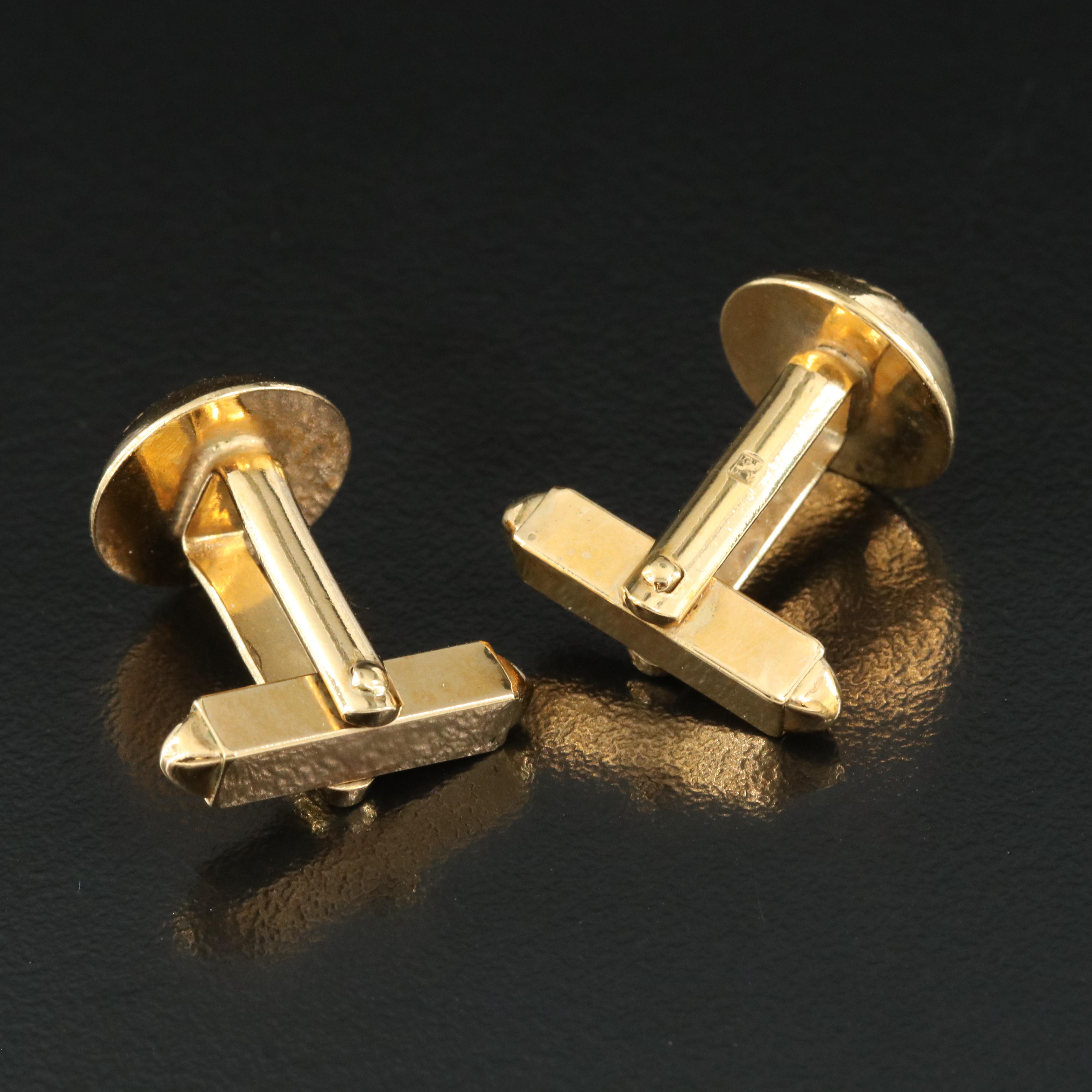 Louis Vuitton Cufflinks in Taiga Leather Case | EBTH