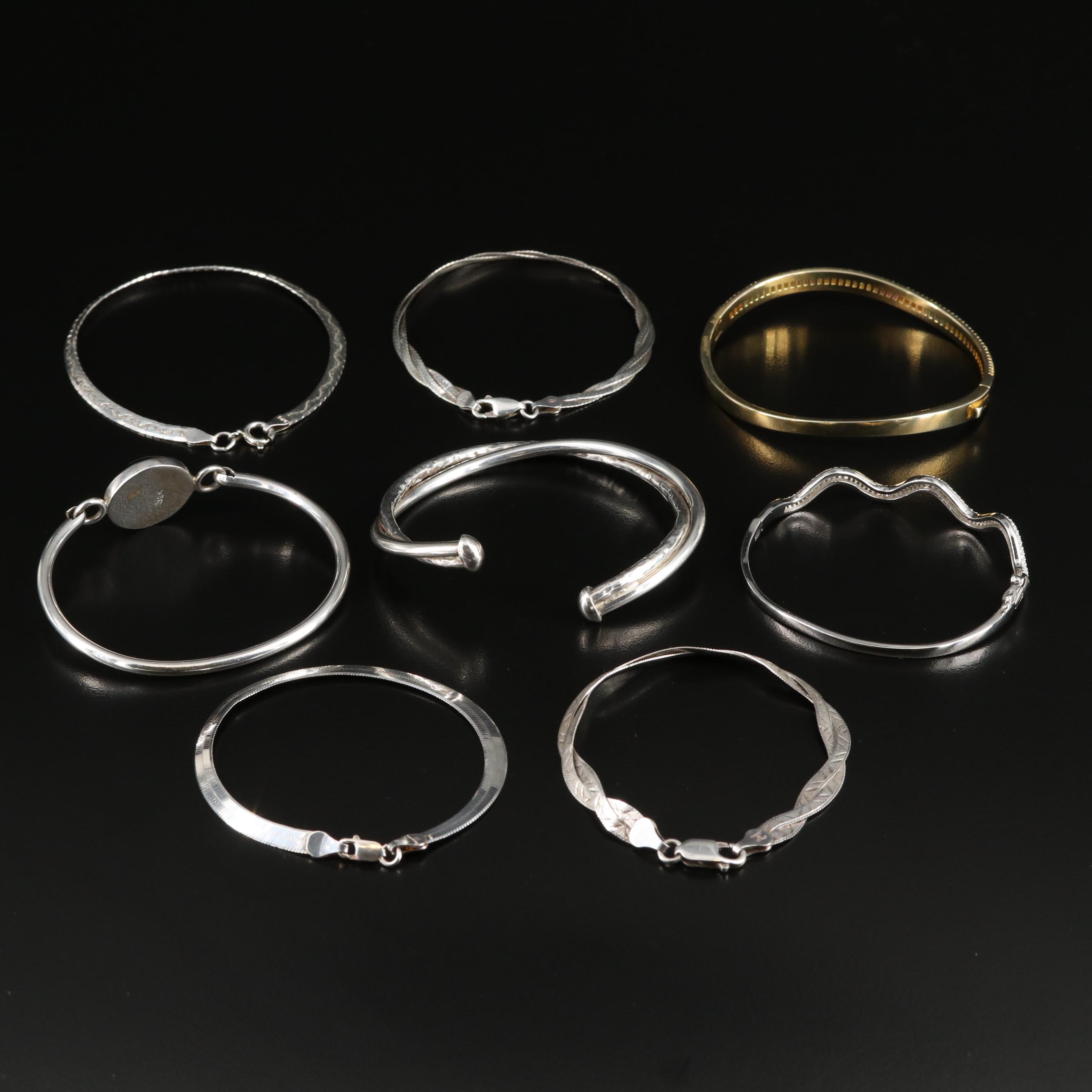 Sterling Bracelet Assortment Including Sapphire and Herringbone Chains | EBTH