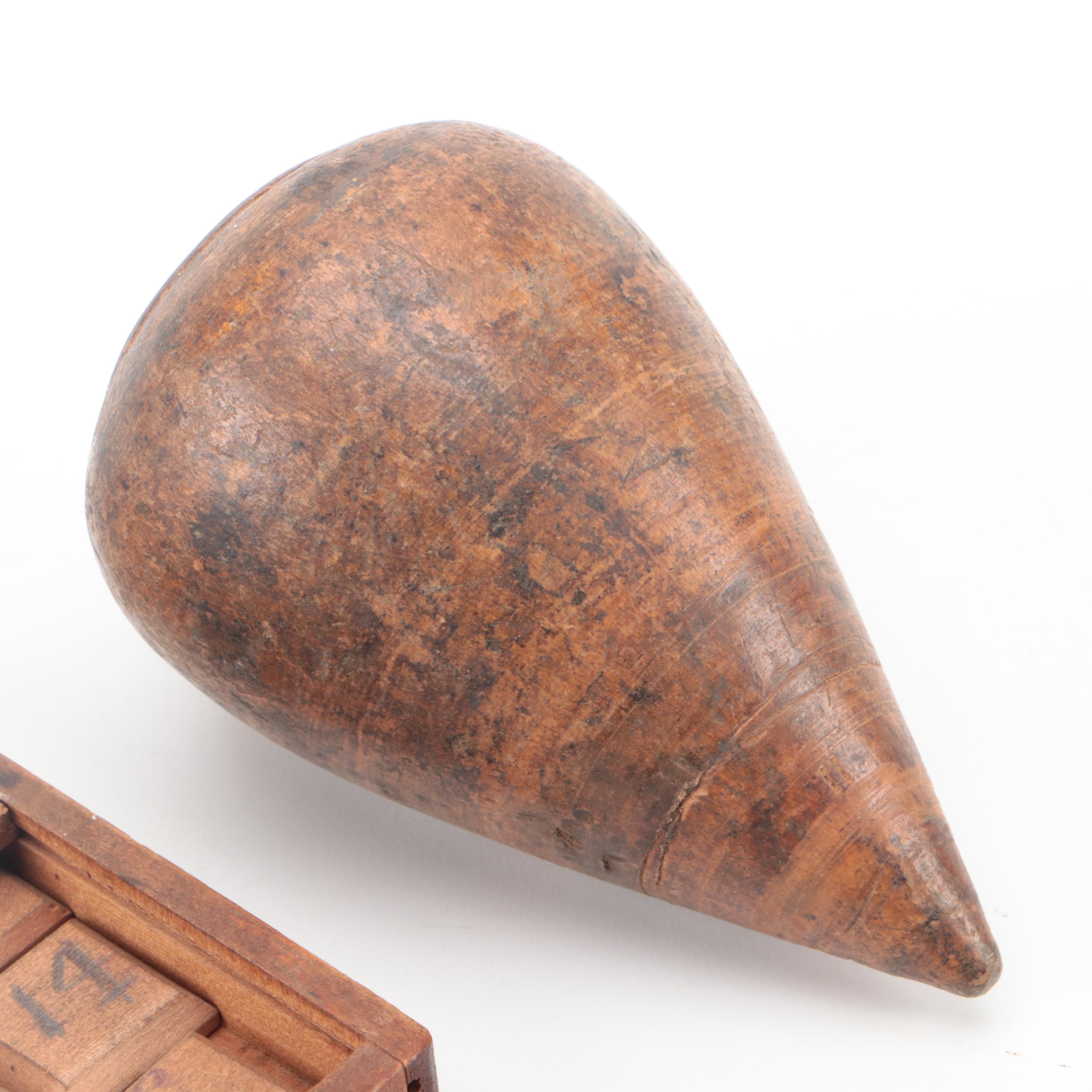 Trilobite Wooden Box with Number Tiles and Carved Wood Spinning Tops | EBTH