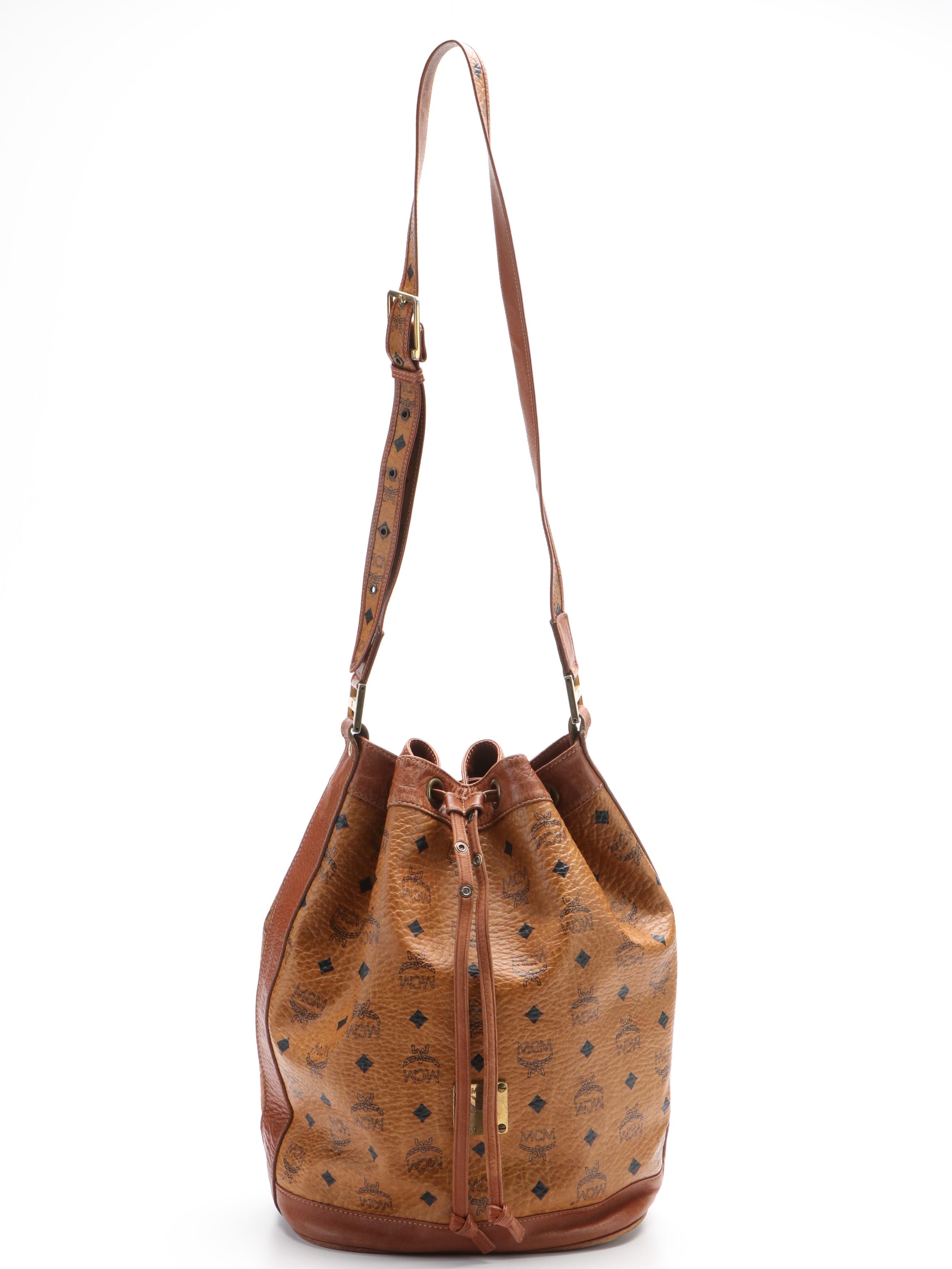 MCM Drawstring Bucket Bag in Cognac Monogram Visetos Leather | EBTH