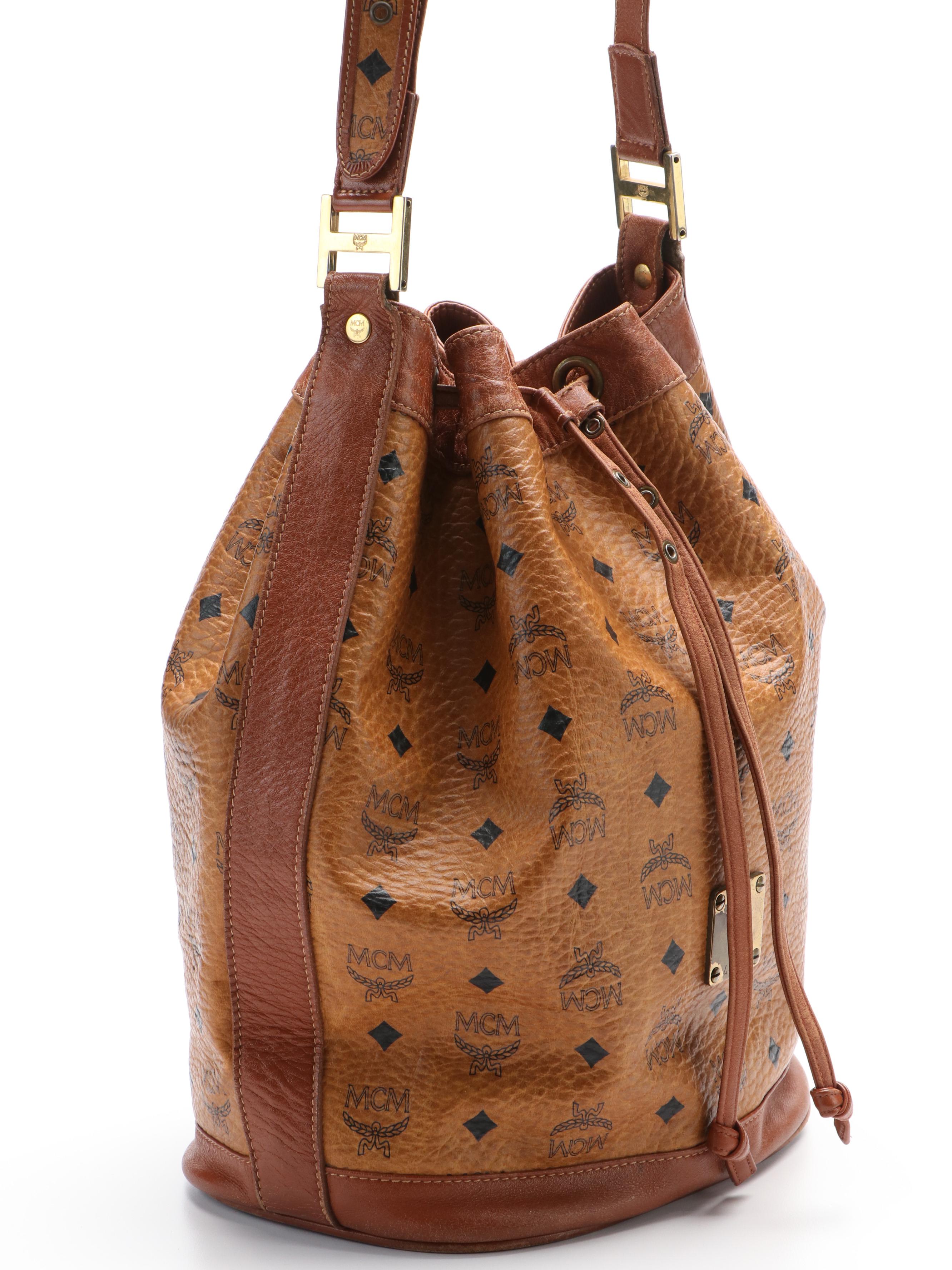 MCM Drawstring Bucket Bag in Cognac Monogram Visetos Leather | EBTH