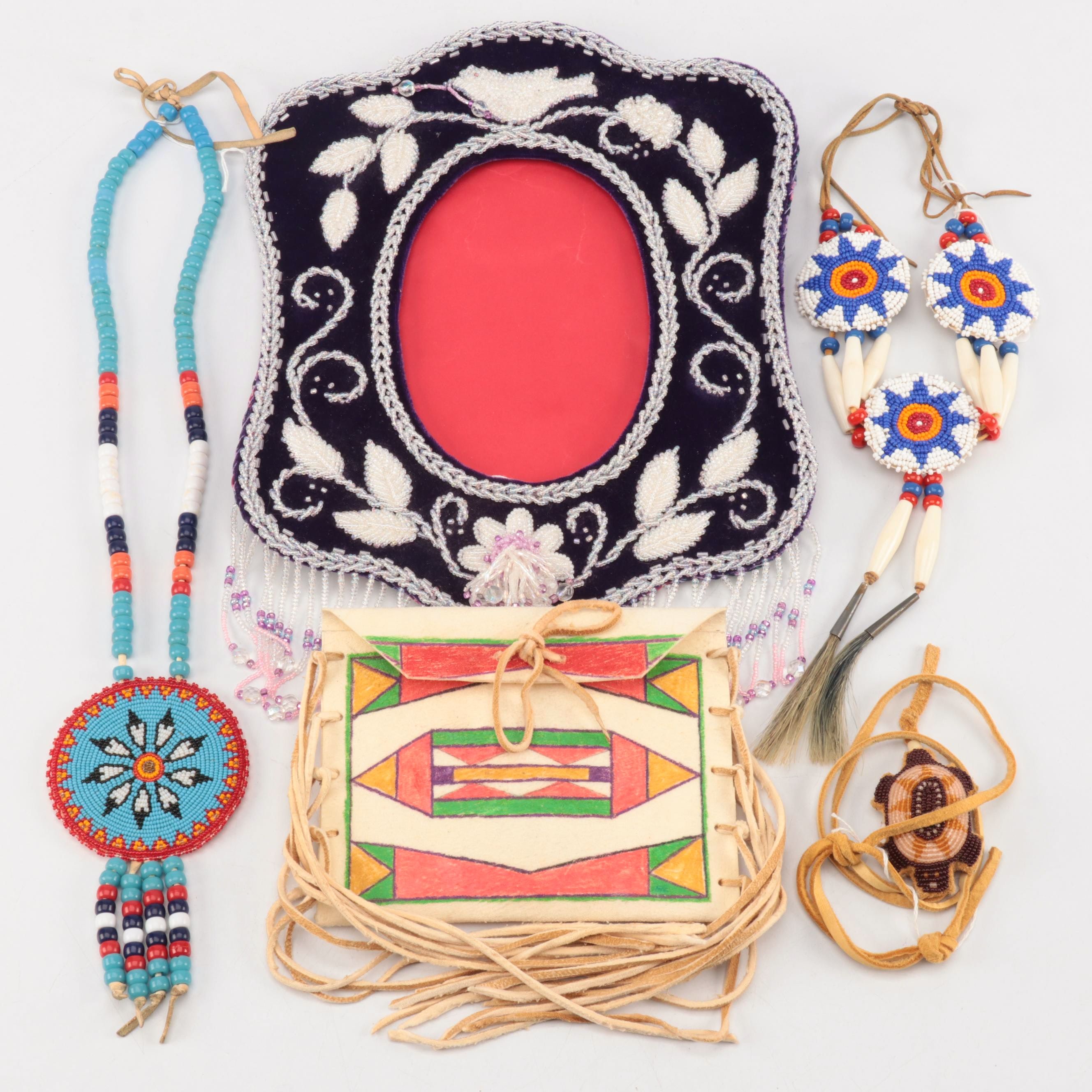 Contemporary Sioux and Ute Objects with a Parfleche, Choker, Amulet and ...