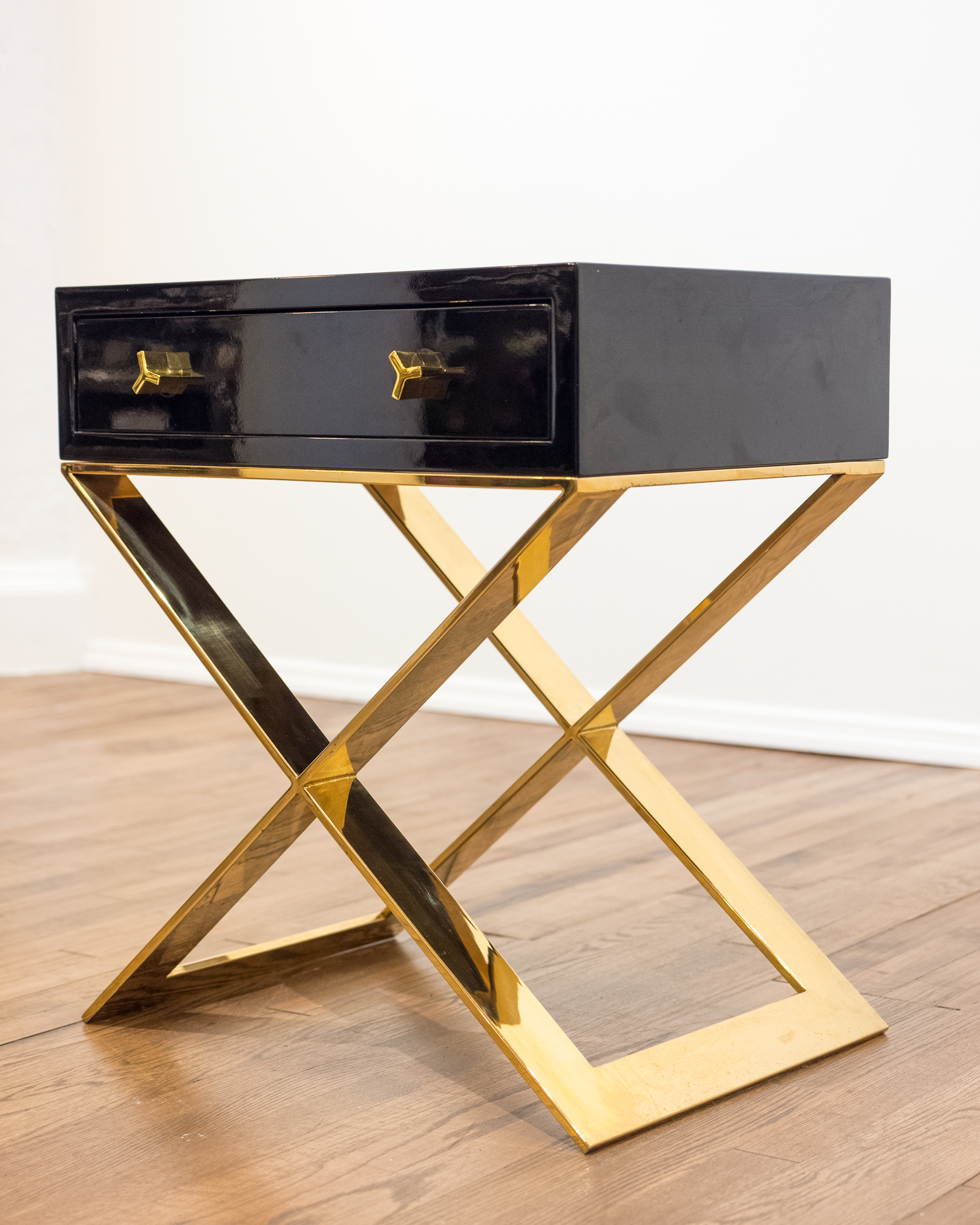 Two Safavieh Black Lacquered End Tables on X-Form Brass Bases ...
