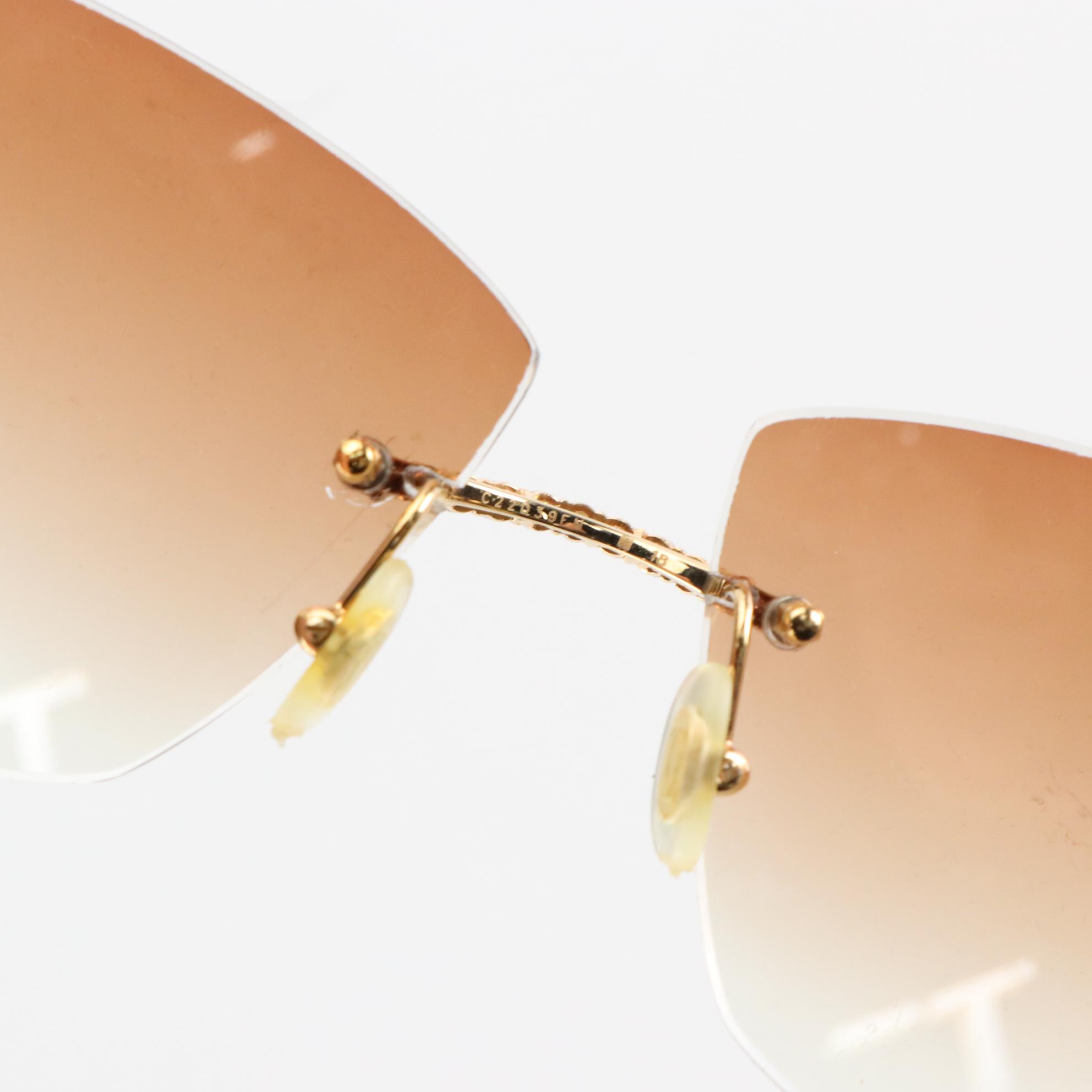 14K Gold and Diamond Cartier CT0029RS Rimless Sunglasses with Case | EBTH