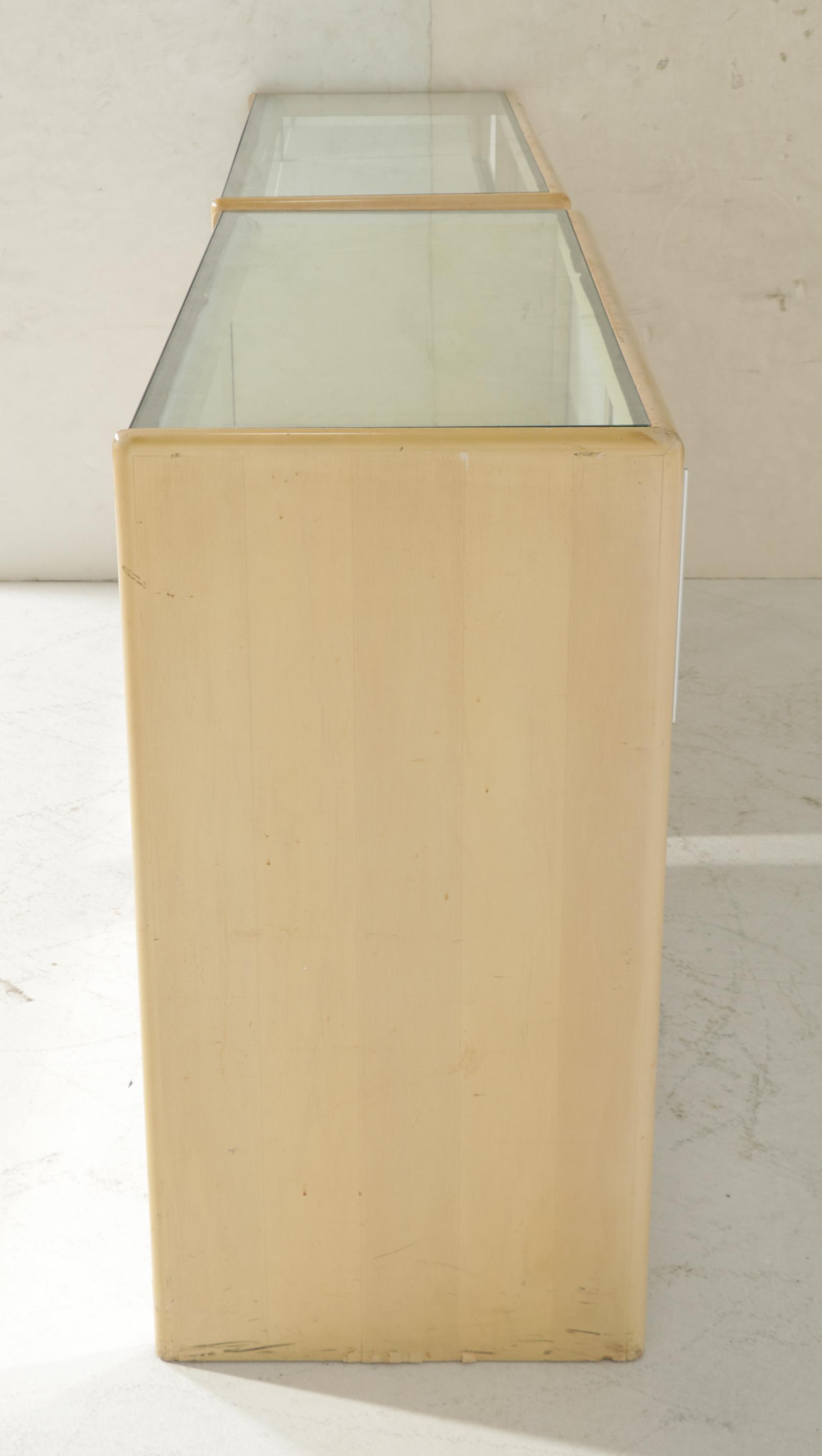 Two Modernist Lacquered Wood and Glass Retail Display Cases | EBTH