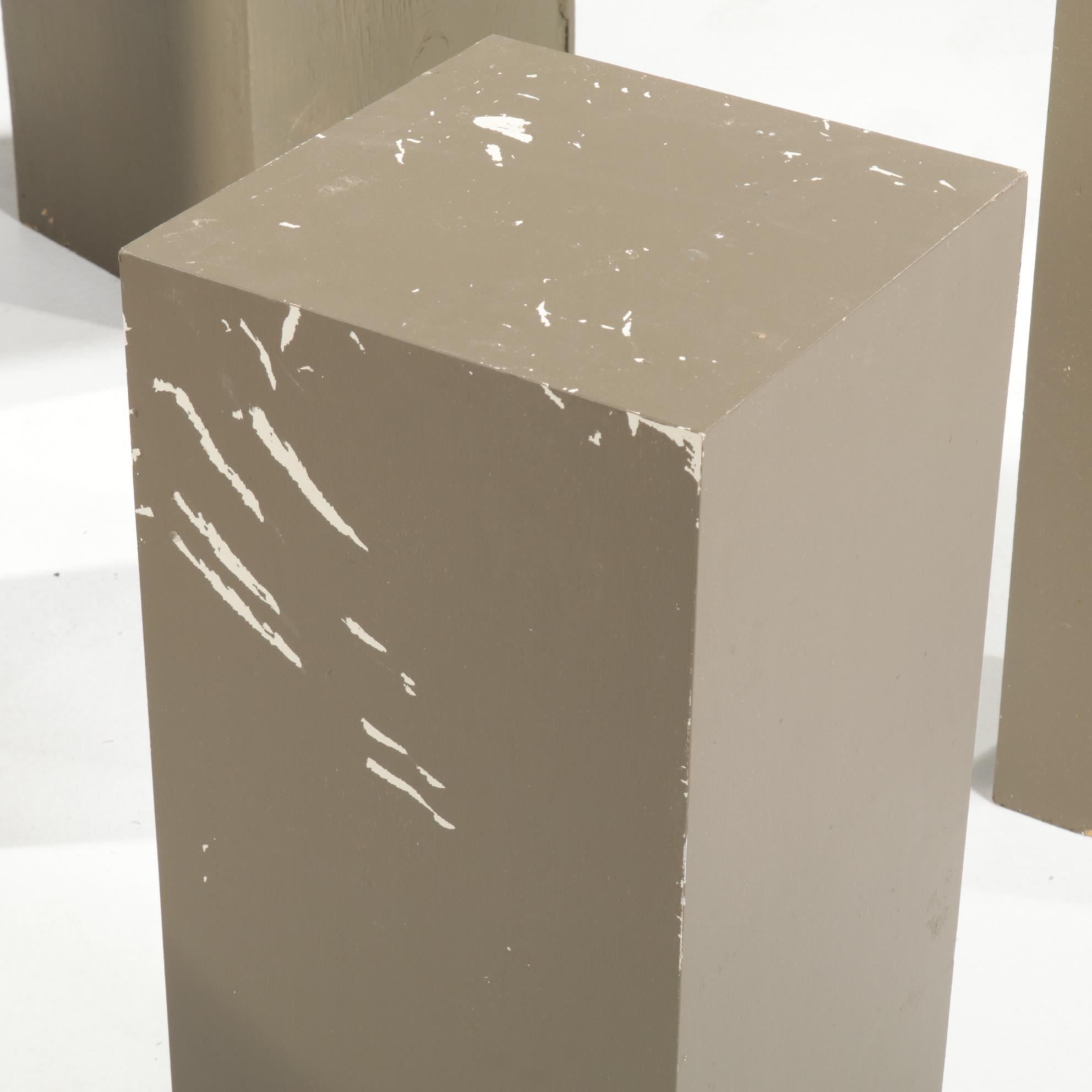 Group of Nine Painted Plywood Art Display Columns | EBTH