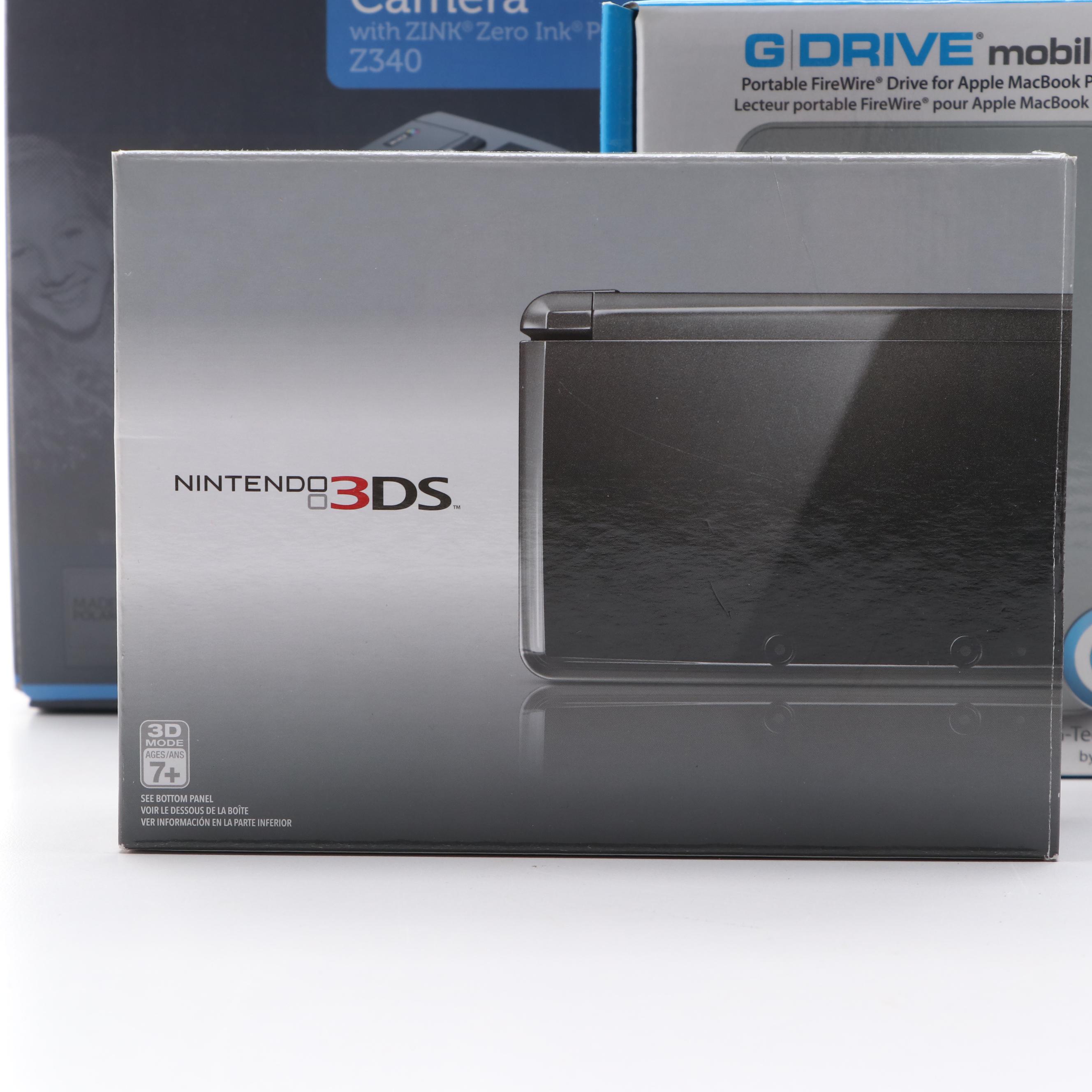 Polaroid Instant Digital Camera, Nintendo 3DS, Adobe Photoshop, G Drive ...