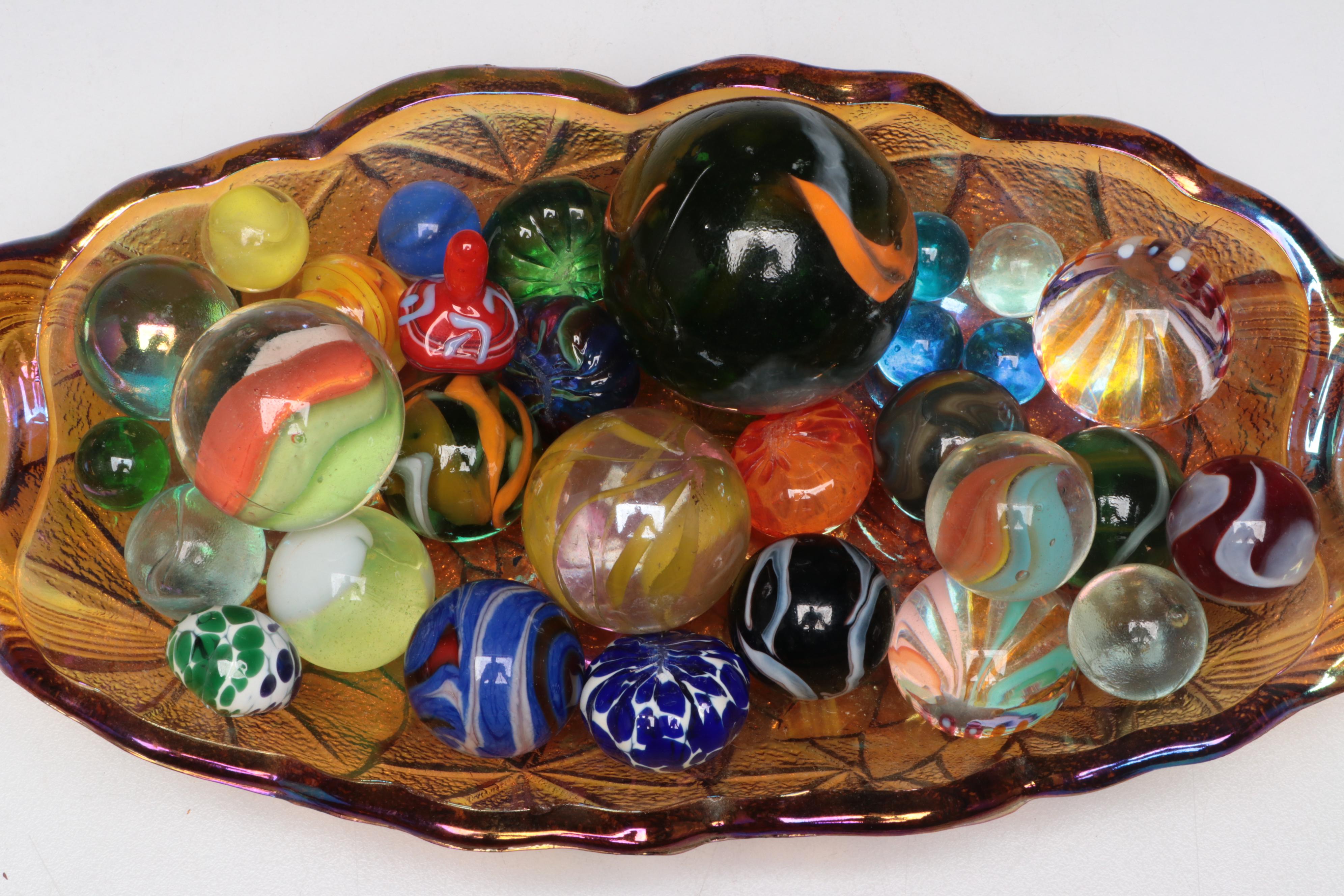 Mad Man Marbles and Other Artist Initialed Dichroic Glass Marbles | EBTH