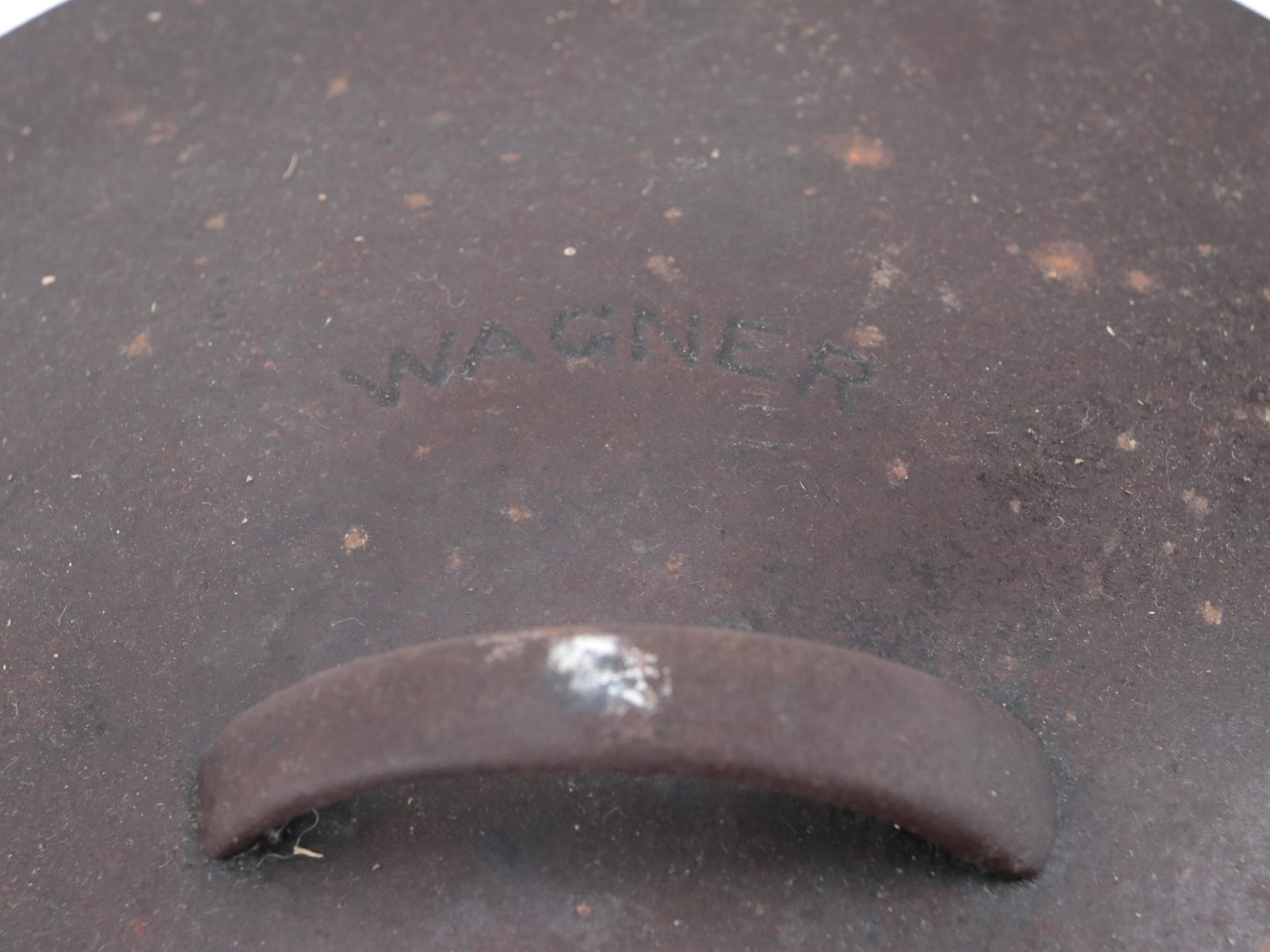 Wagner Cast Iron Dutch Oven with Trivet and Spring Scale | EBTH