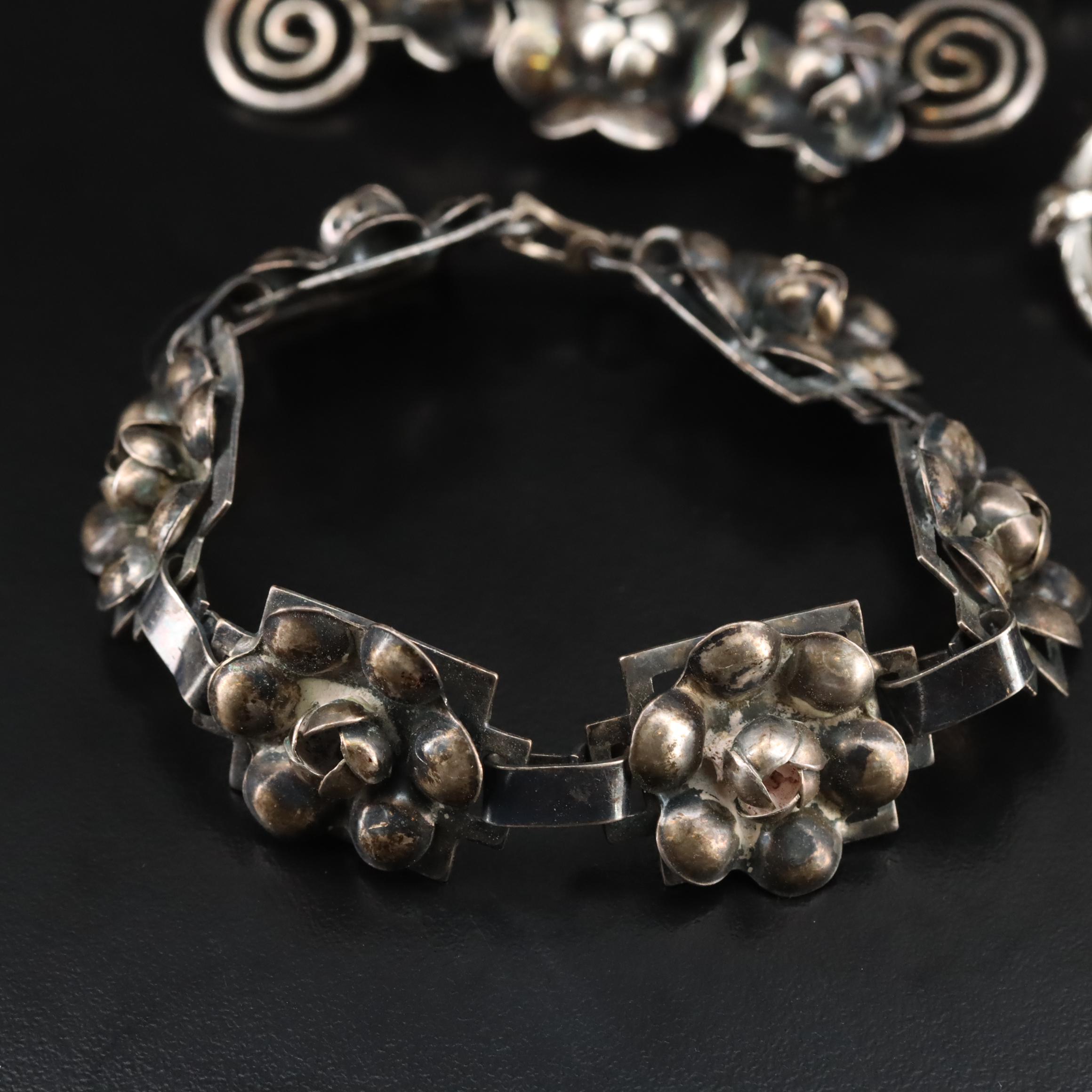 Stuart Nye Featured in Vintage Sterling Floral Jewelry | EBTH