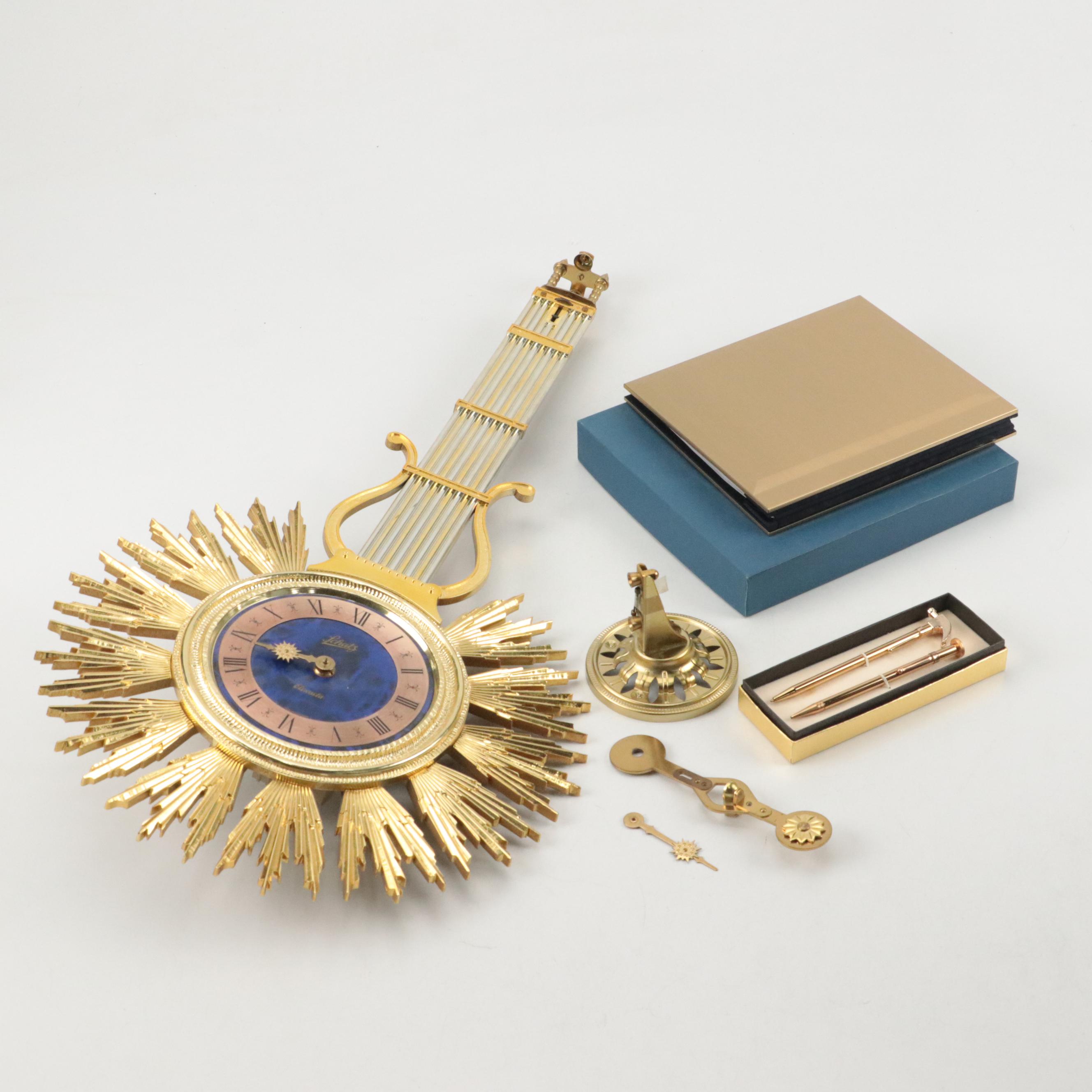 Schatz Elexacta Sunburst Wall Clock with Photo Album and Pen Set | EBTH