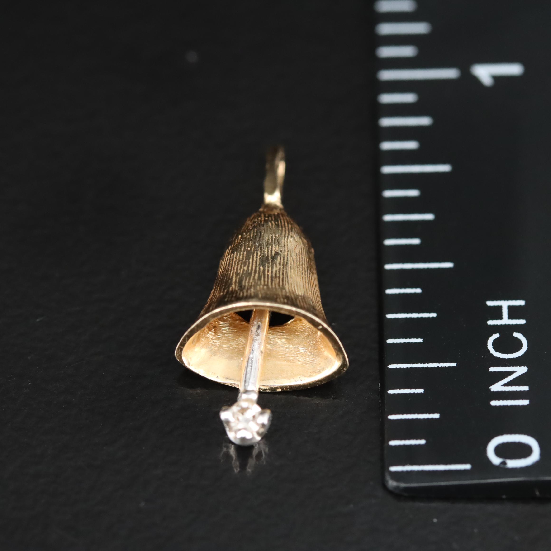 14K 0.02 CT Diamond Articulated Bell Pendant | EBTH