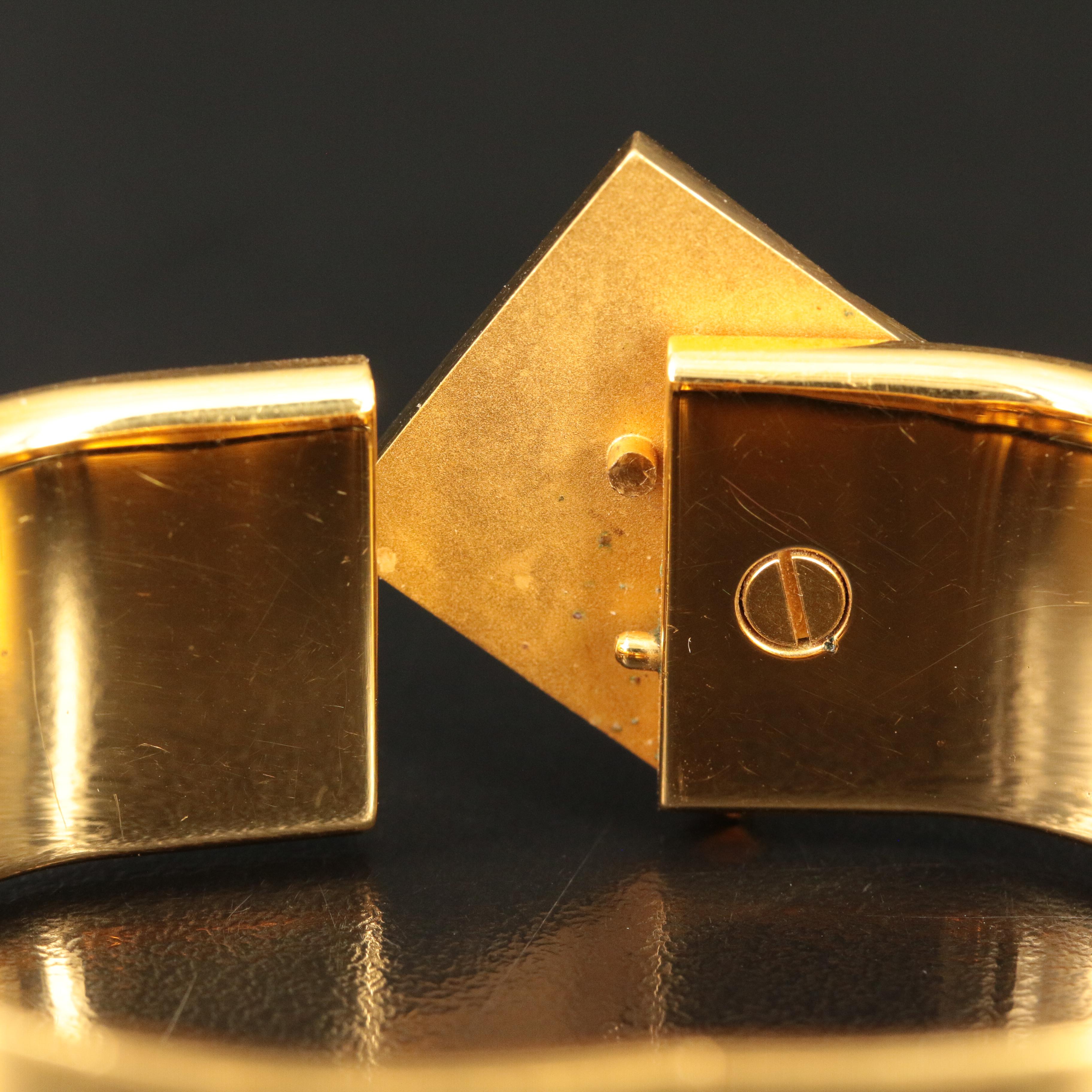 Hermès "Cosmo Charriot" Enamel Twist Lock Bracelet | EBTH