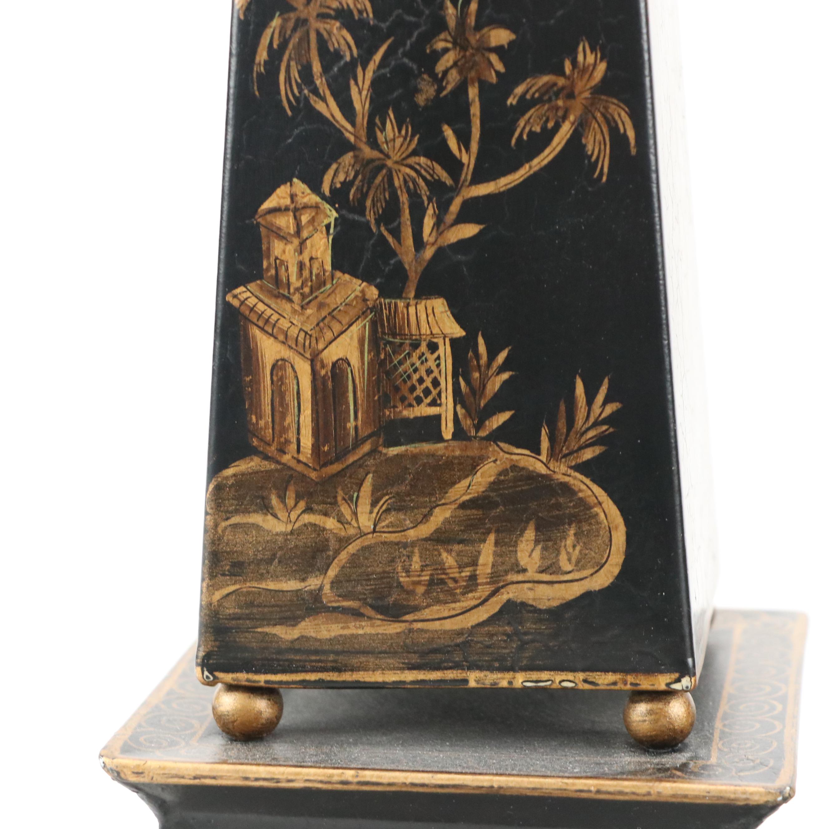 Japanese Ebonized and Gilded Metal Obelisks | EBTH