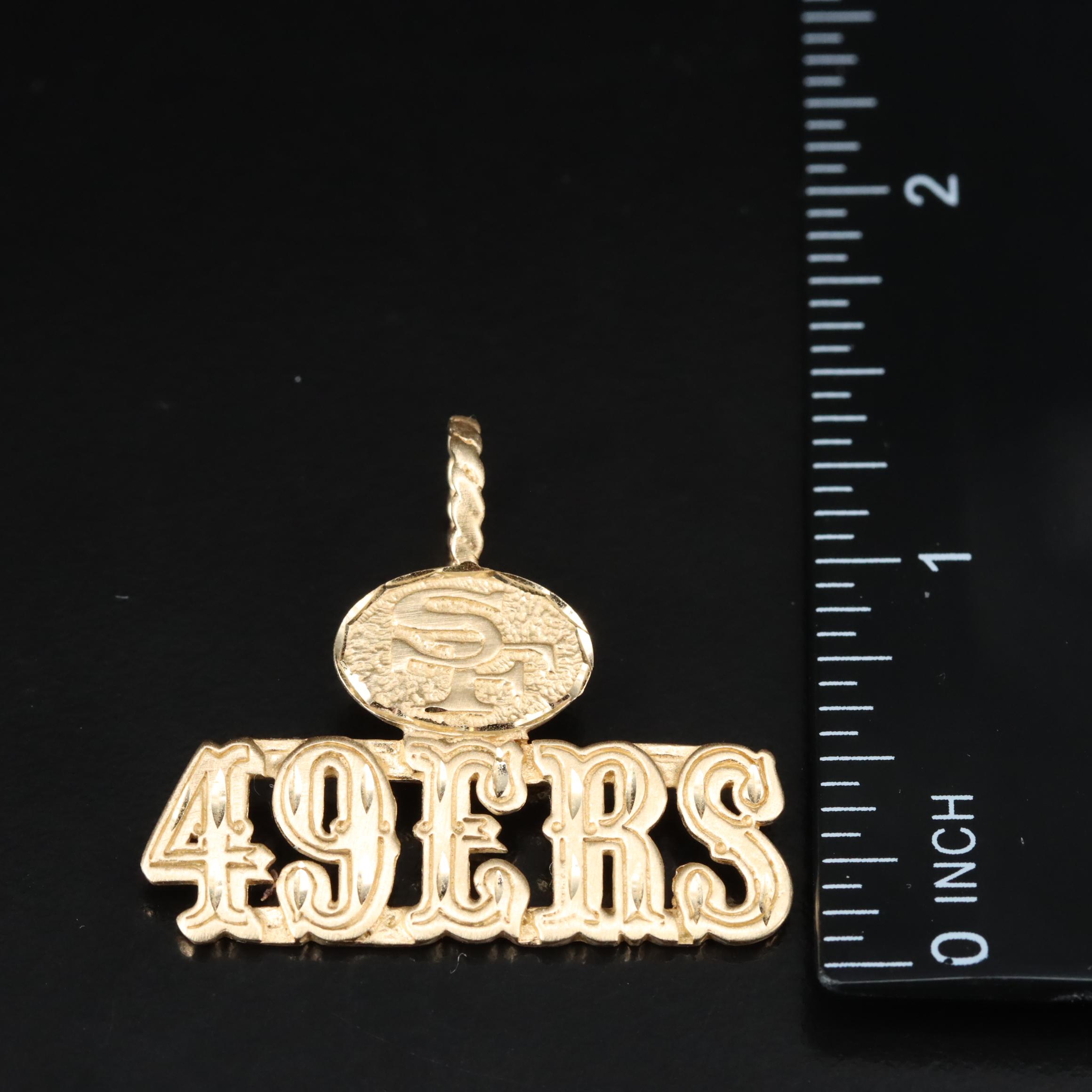 14K San Francisco 49ers Football Pendant | EBTH
