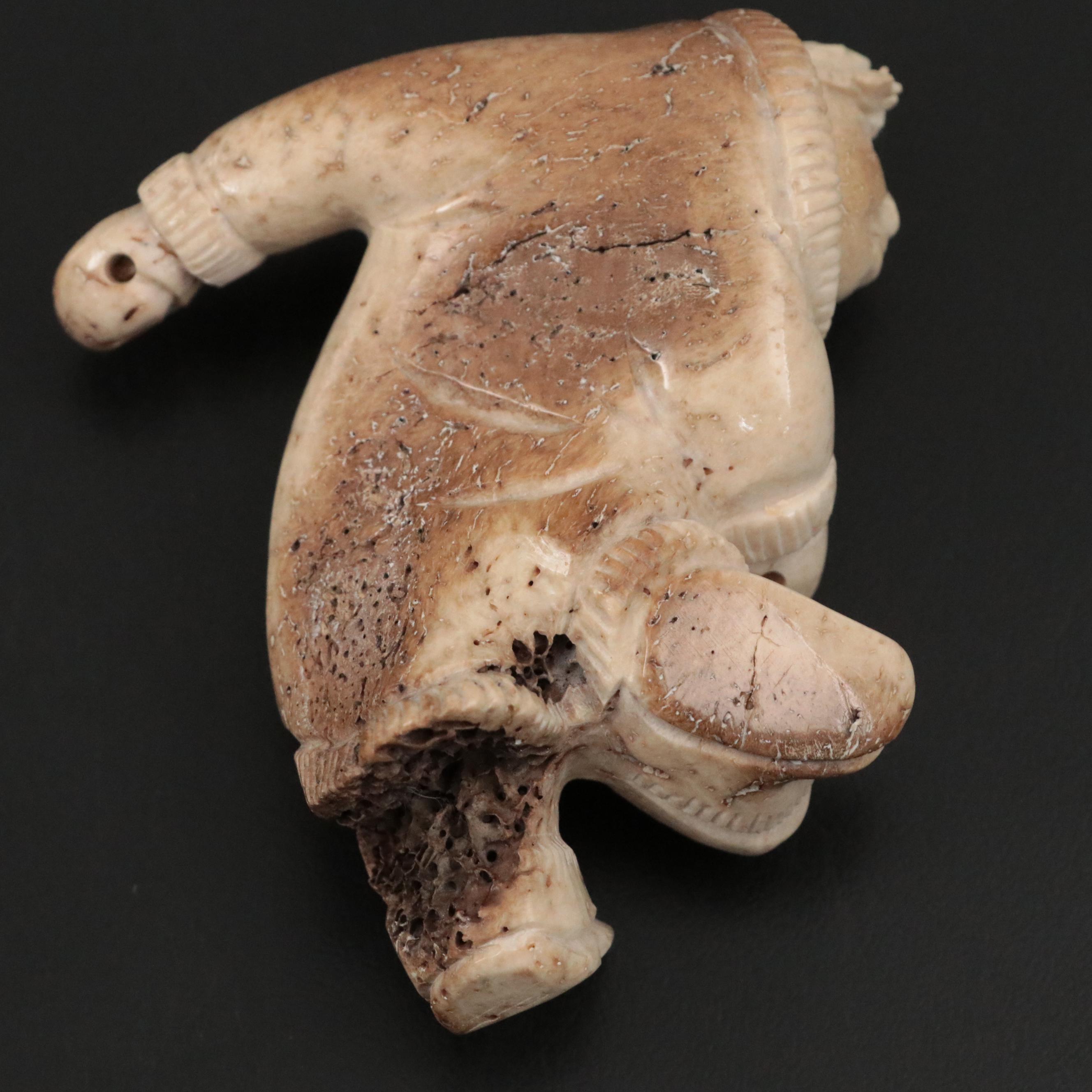 Inuit Carved Bone Figure of a Hunter | EBTH